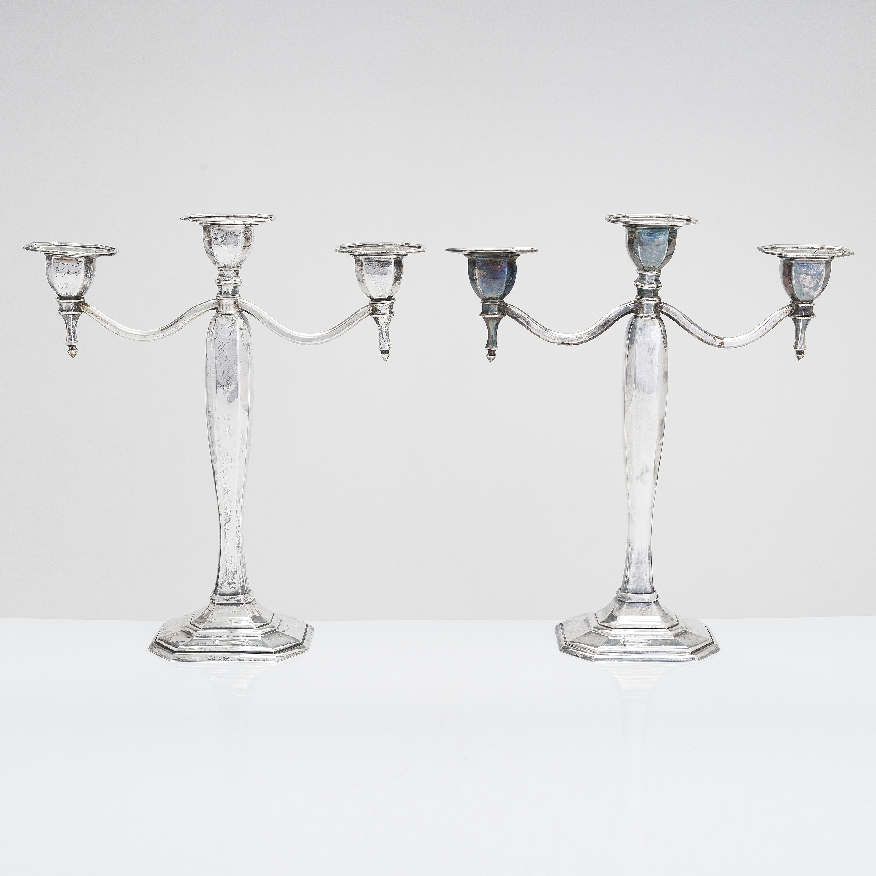 A pair of Suzuyo silver candelabra, jungin mark, Japan, Meiji Period ...
