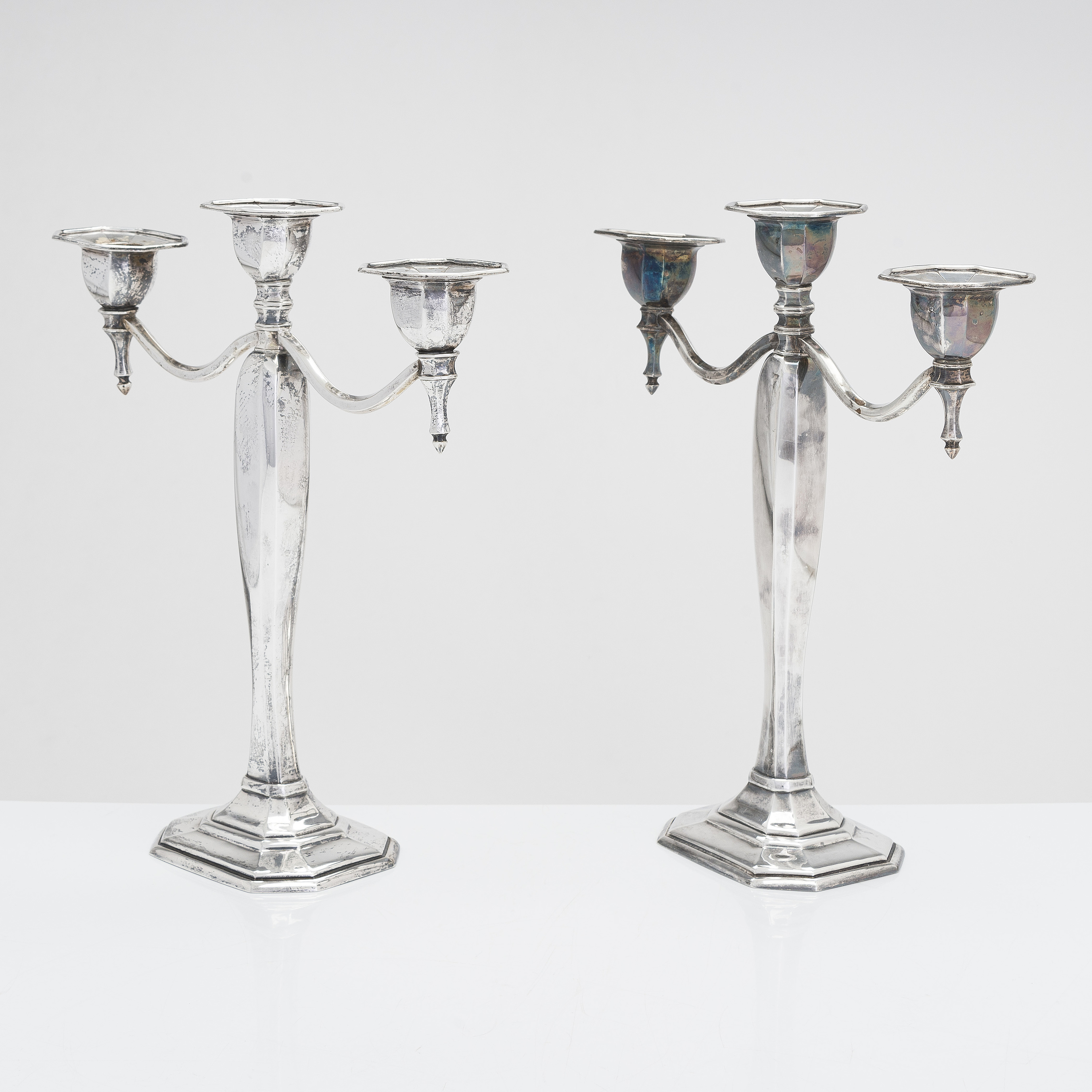 A pair of Suzuyo silver candelabra, jungin mark, Japan, Meiji Period ...