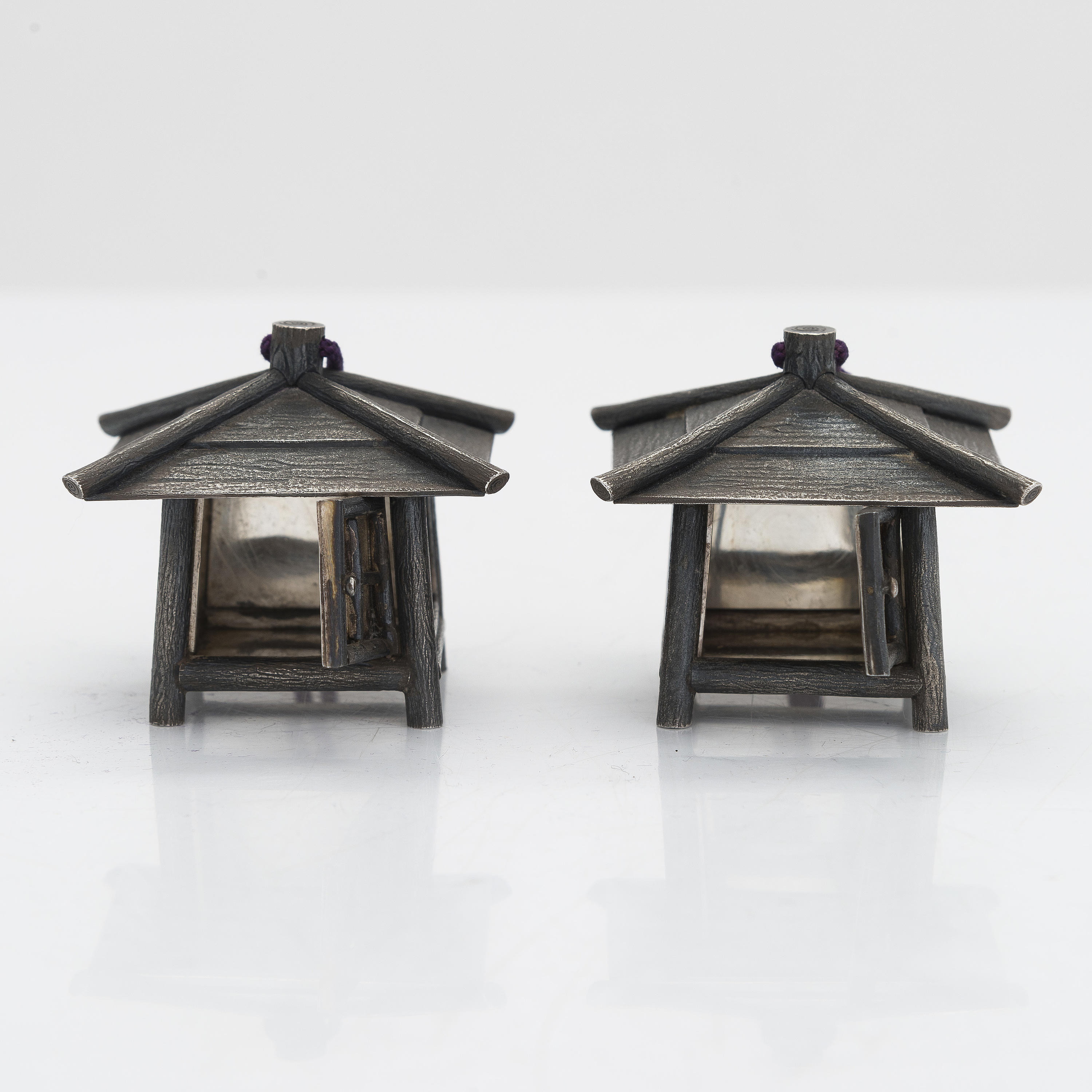 A pair of Japanese sterling silver lantern shape boxes, jungin mark for ...