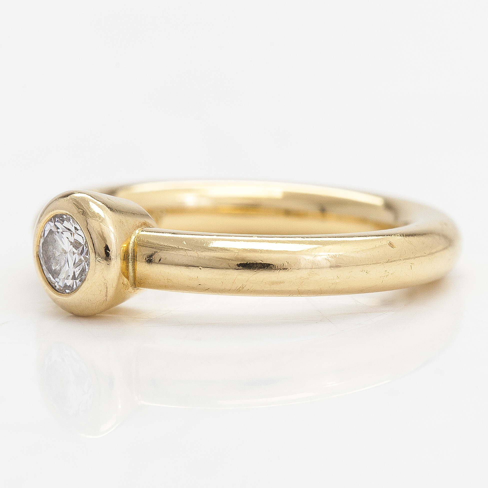 Torbjörn Tillander, an 18K gold ring, brilliant-cut diamond approx. 0.25 ct. Helsinki 1998 ...