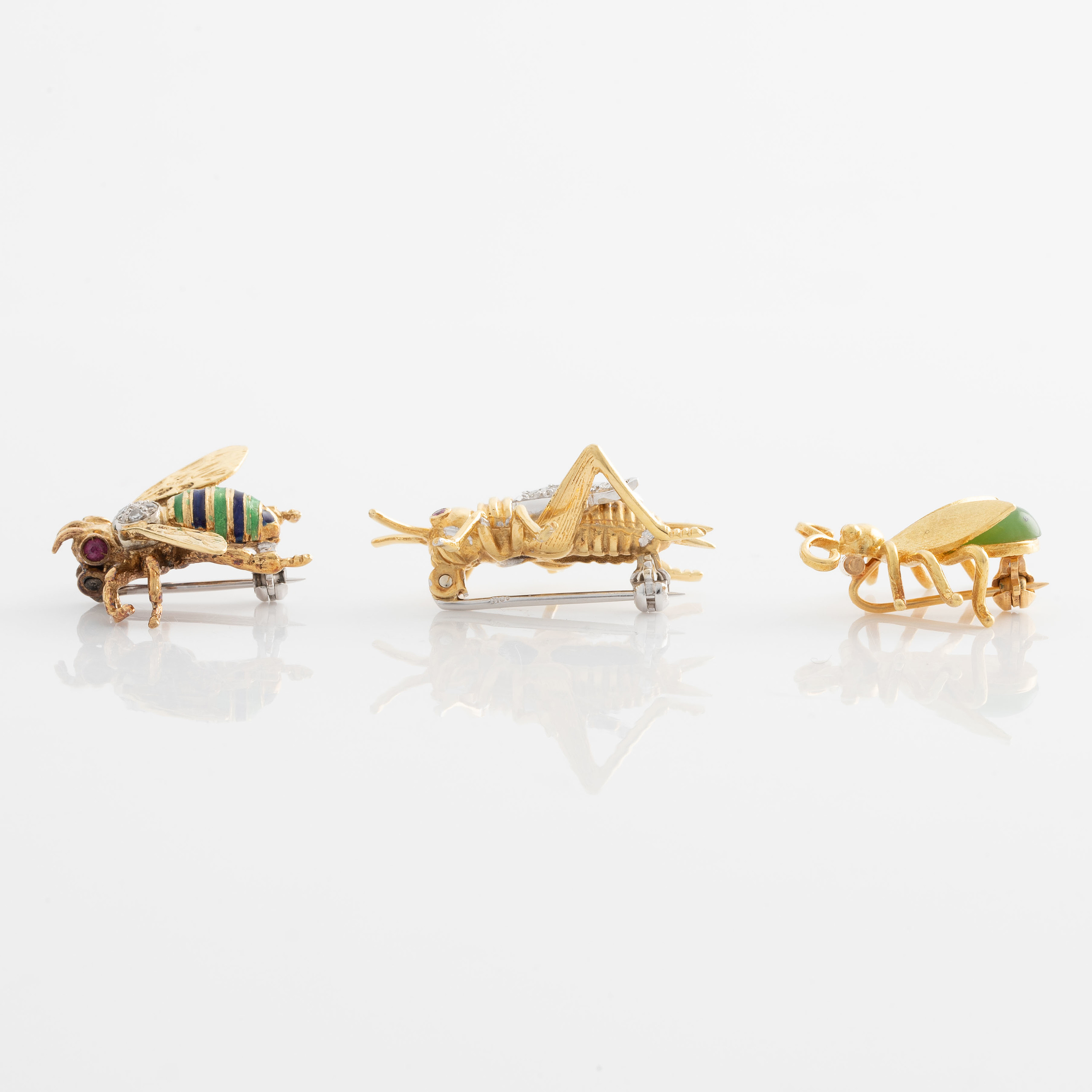 Three brooches in the shape of insects, 18K gold. - Bukowskis
