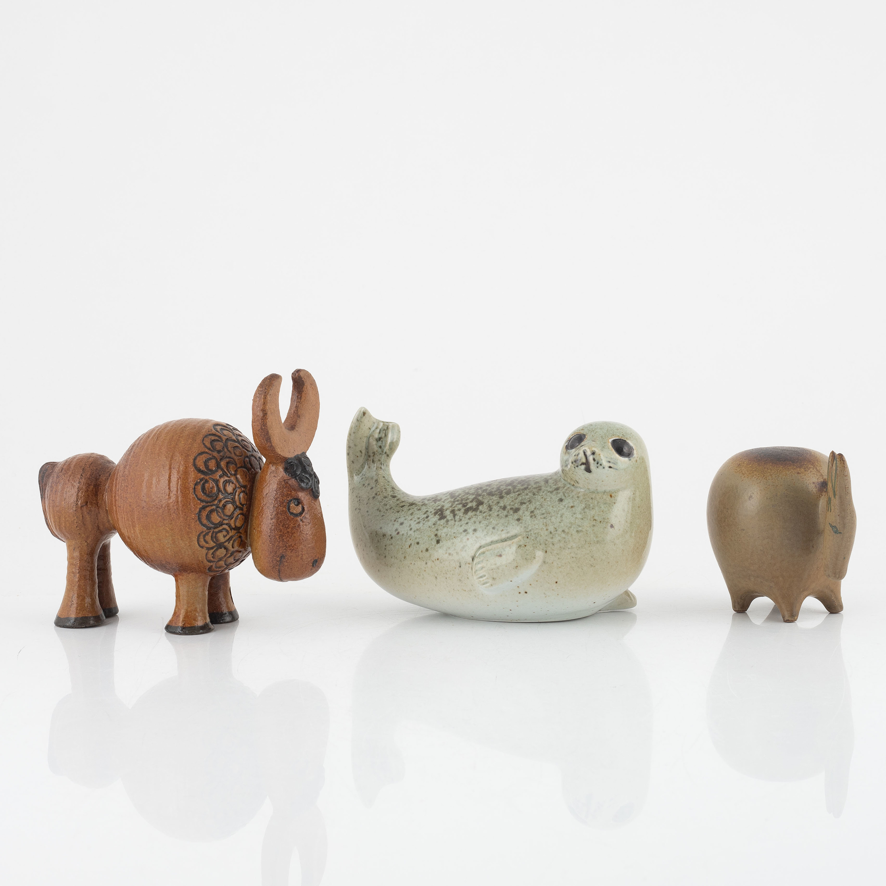 Lisa Larson, a group of three figurines, Gustavsberg. - Bukowskis