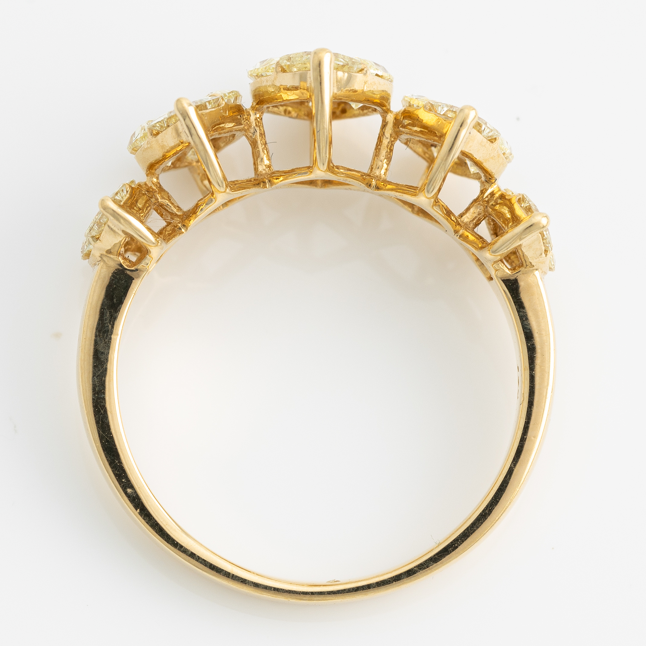 Ring, with yellow oval and princess-cut diamonds. - Bukowskis