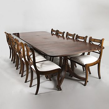 A dinner table and thirteen chairs, England, latter half of the 20th ...