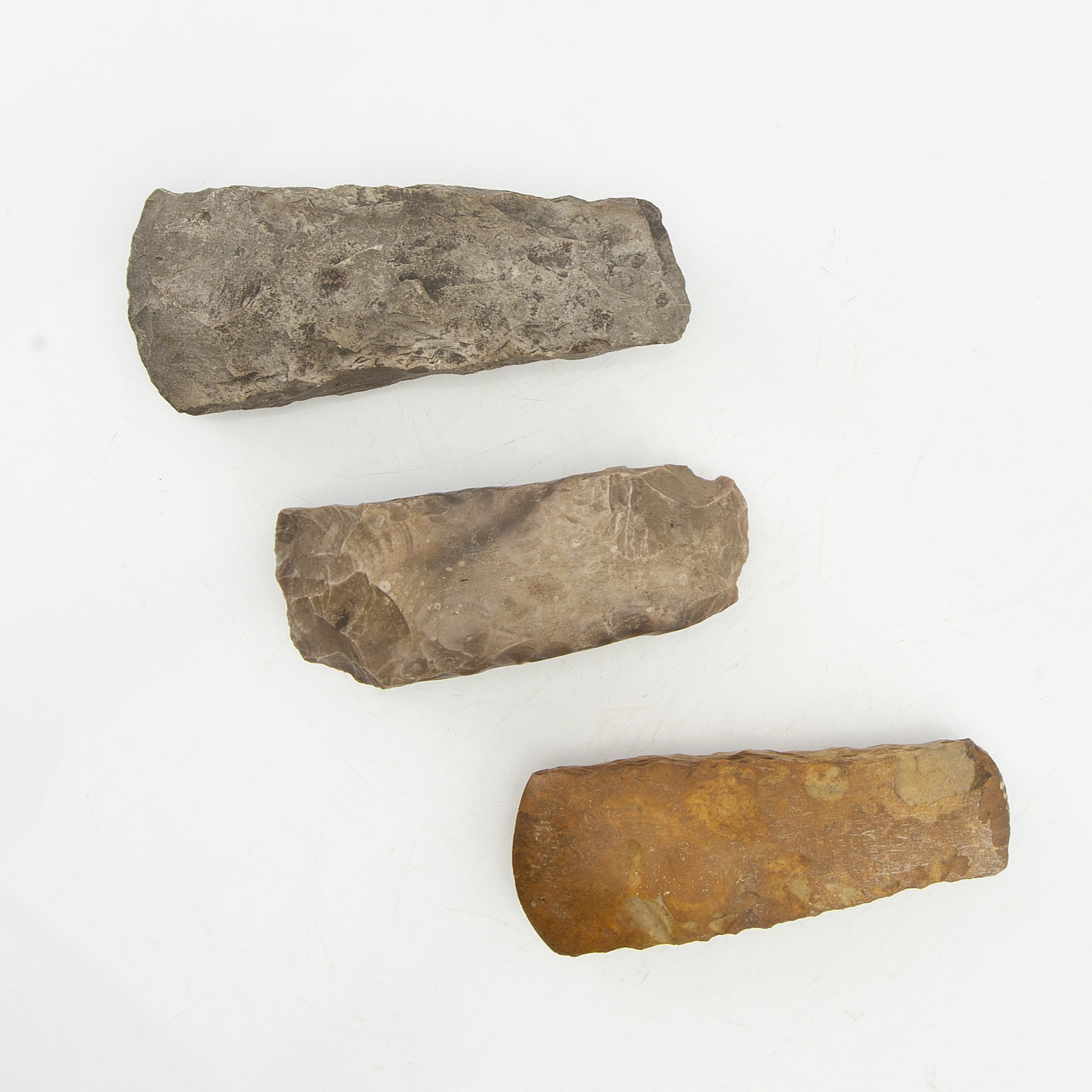 Three flint axes, Neolithic period. - Bukowskis