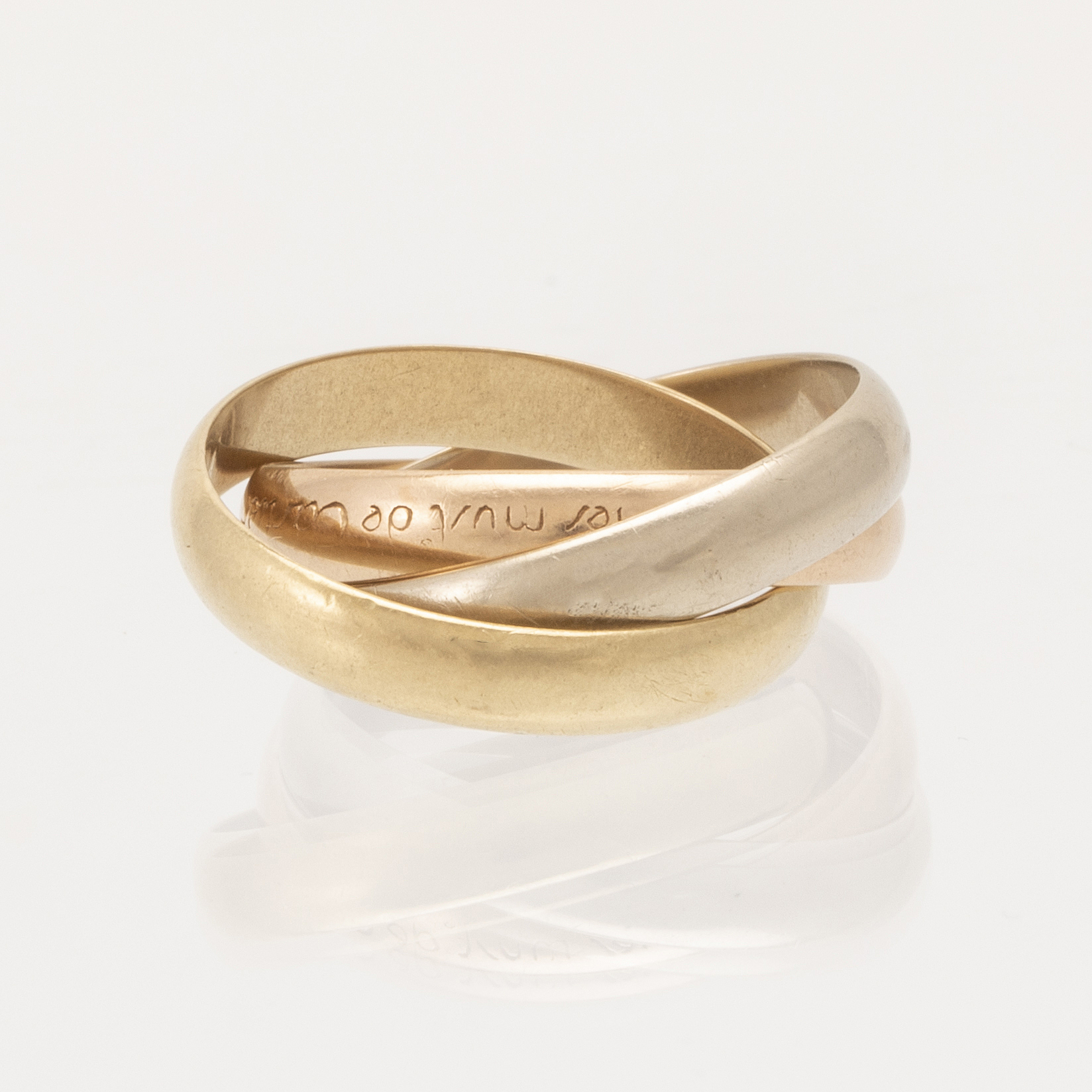 An 18K tri-coloured "Trinity" gold ring by Cartier. - Bukowskis