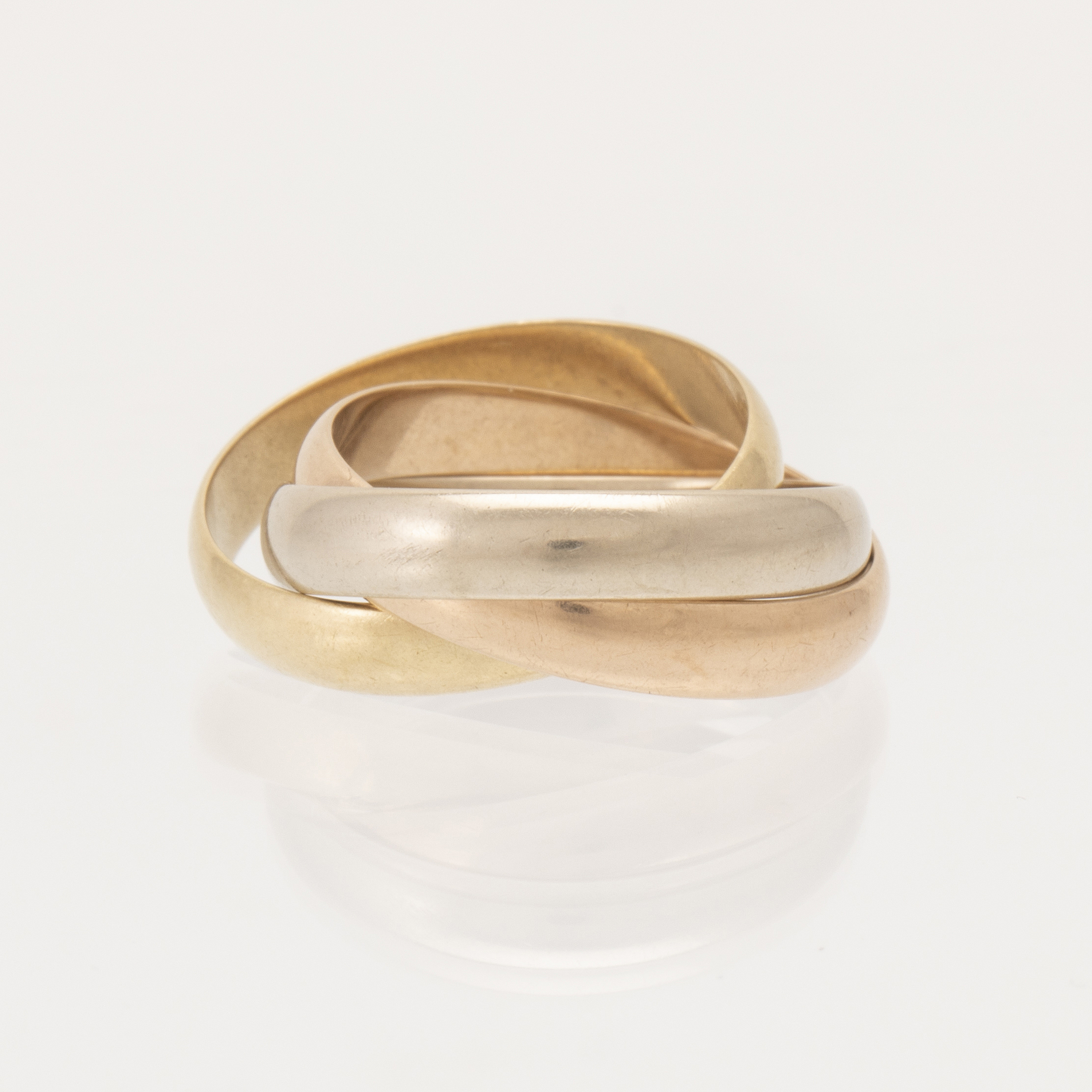 An 18K tri-coloured "Trinity" gold ring by Cartier. - Bukowskis