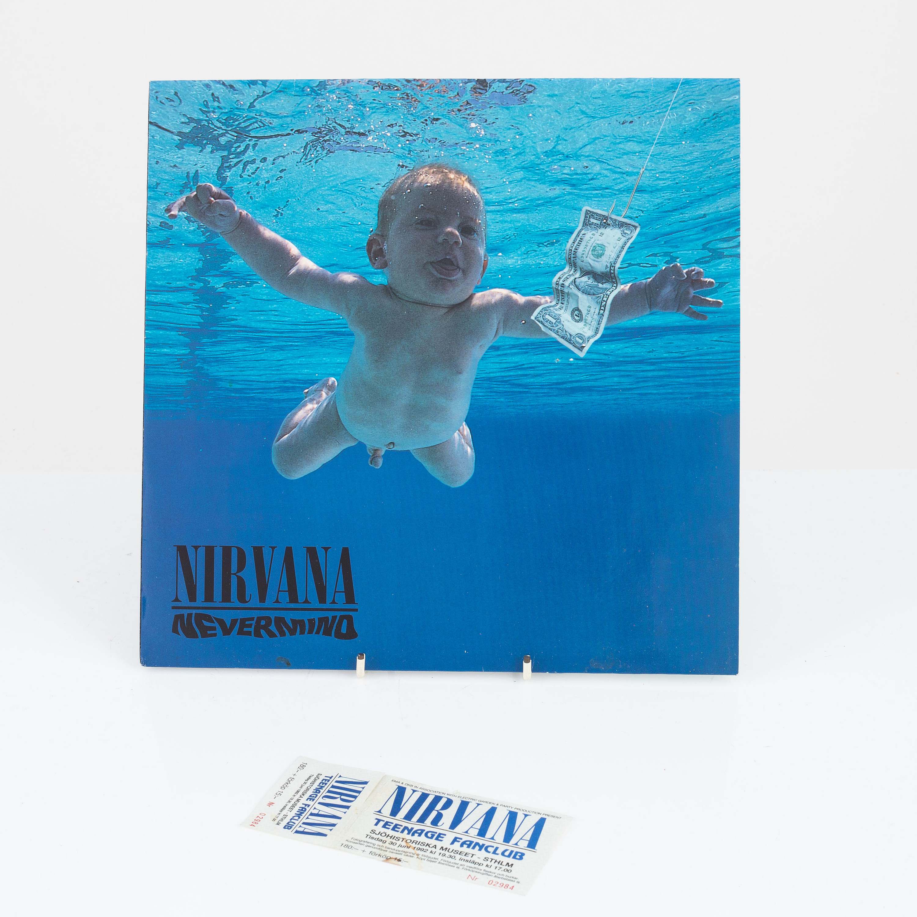 Nirvana, "Nevermind", LP, 1991, and a Nirvana concert ticket ...