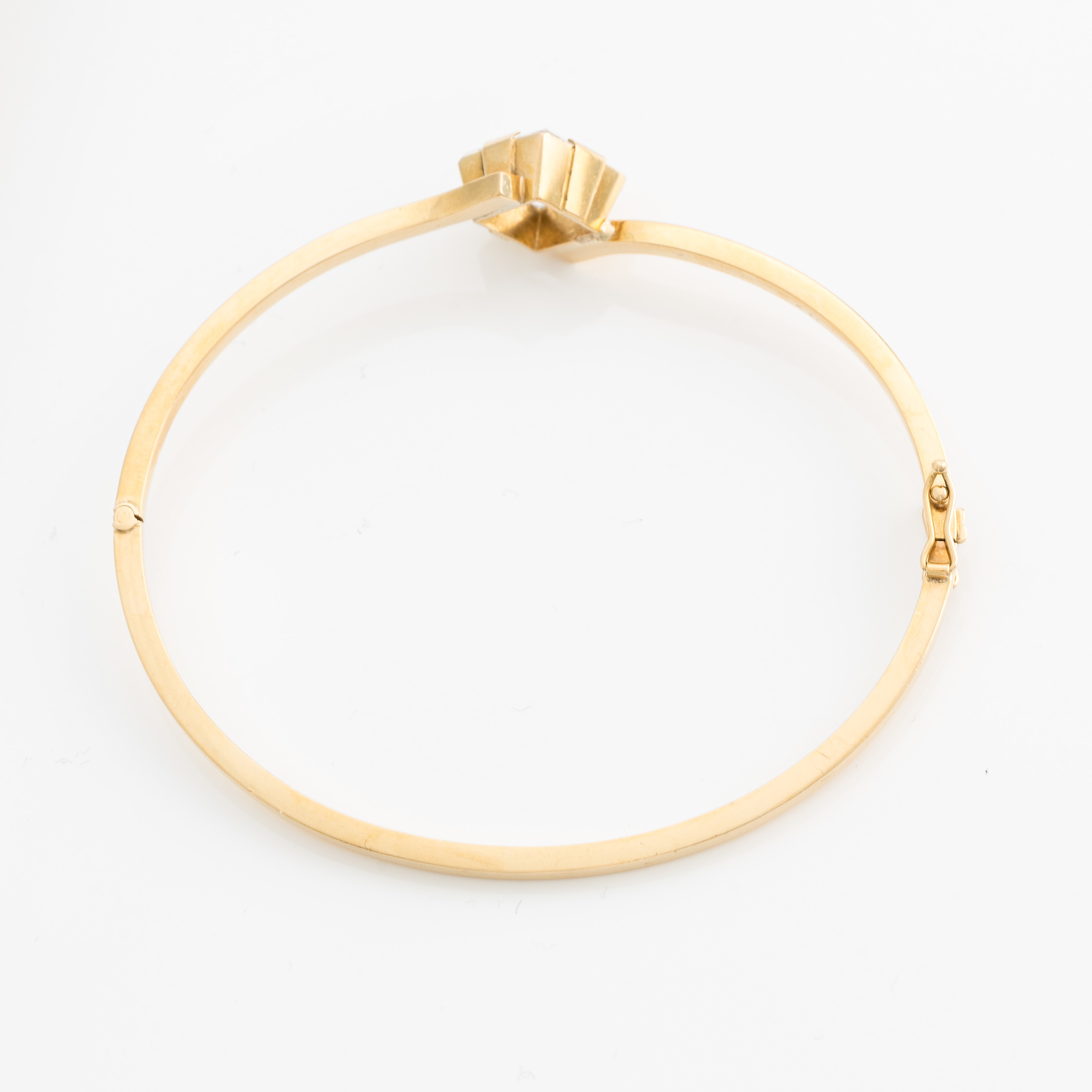 Bangle 18K gold with rock crystal. - Bukowskis