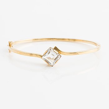 Bangle 18K gold with rock crystal. - Bukowskis