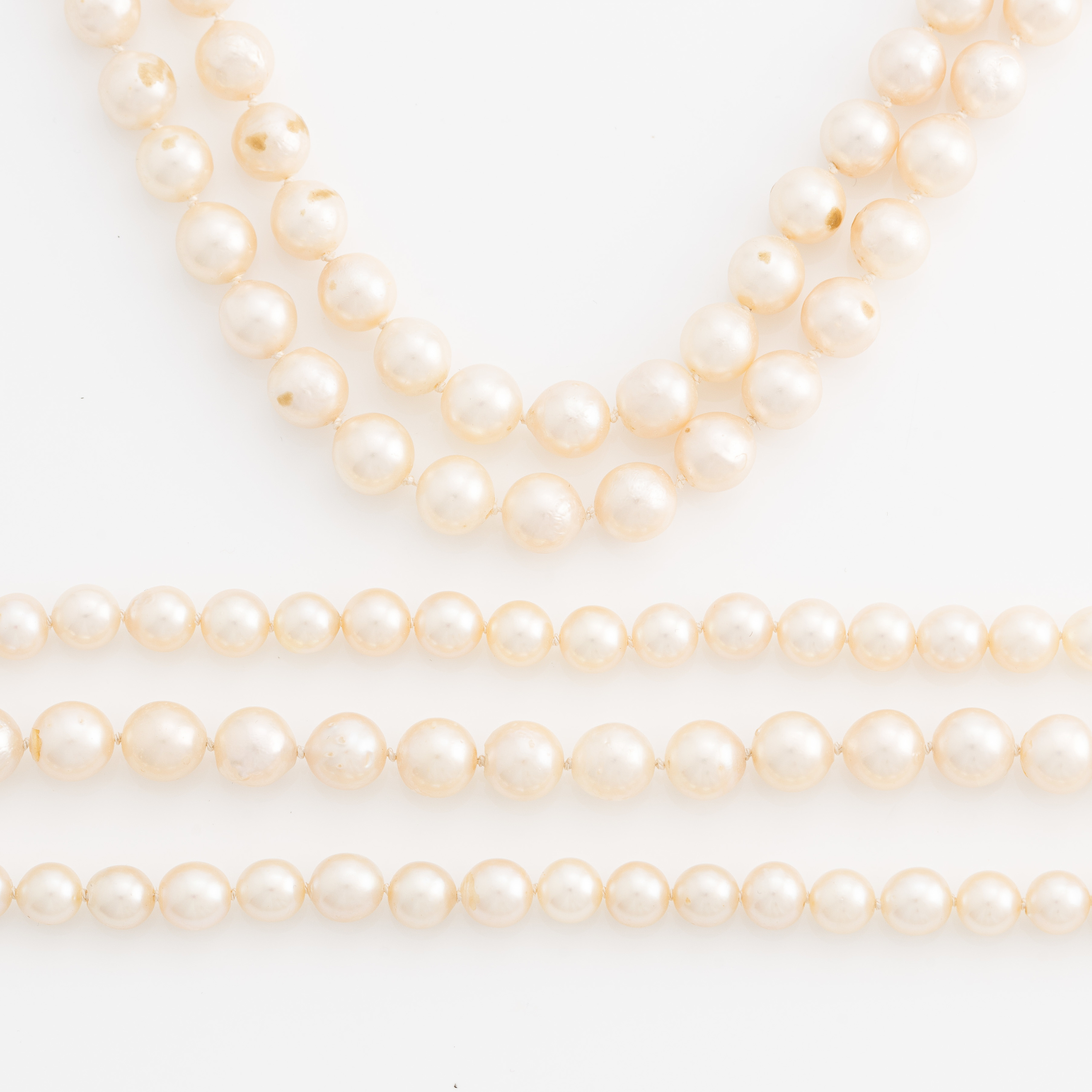 Two necklaces and three bracelets with cultured pearls, for Ole ...