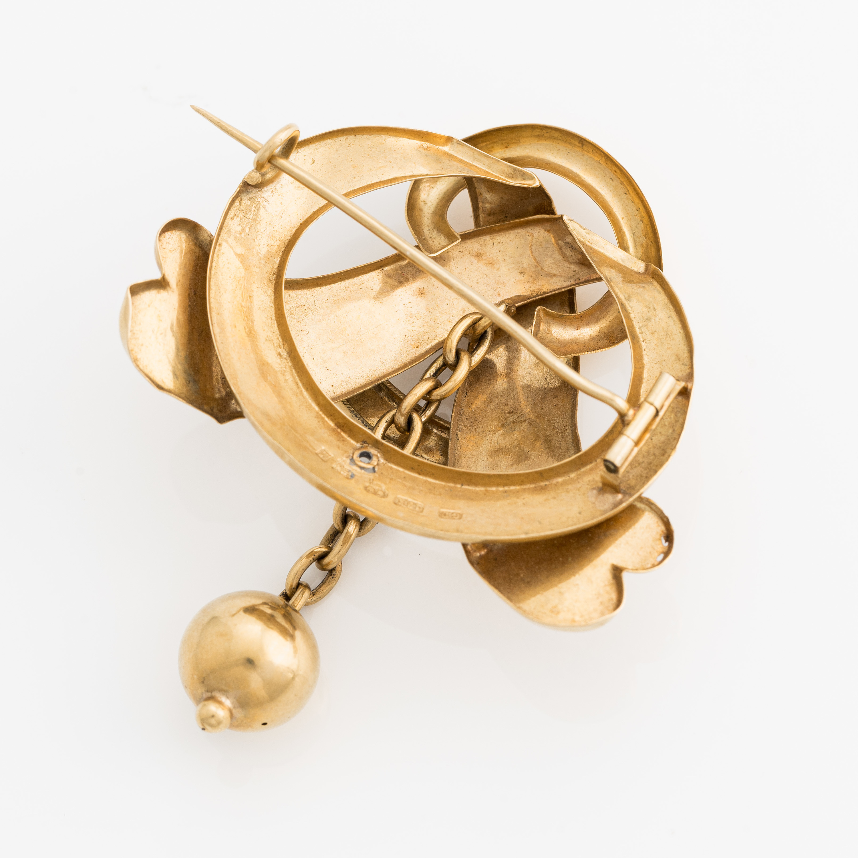 Brooch, 18K gold with a spherical clasp. - Bukowskis