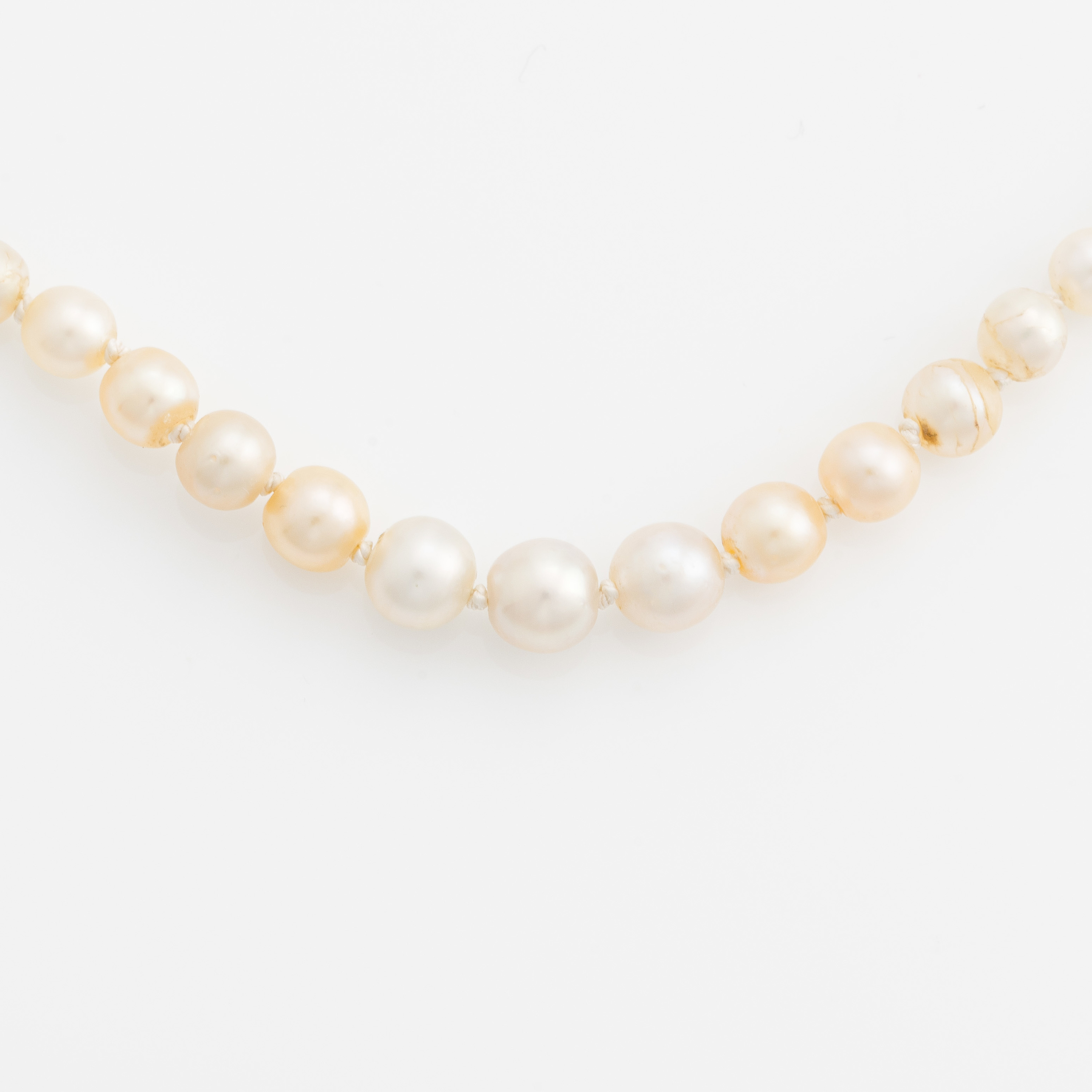 Pearl necklace, graduated pearls, with clasp featuring two old-cut ...