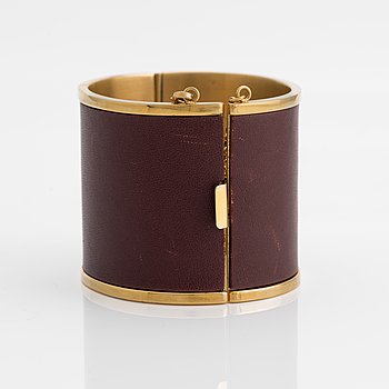 Céline, bangle, gold-tone metal and leather. - Bukowskis