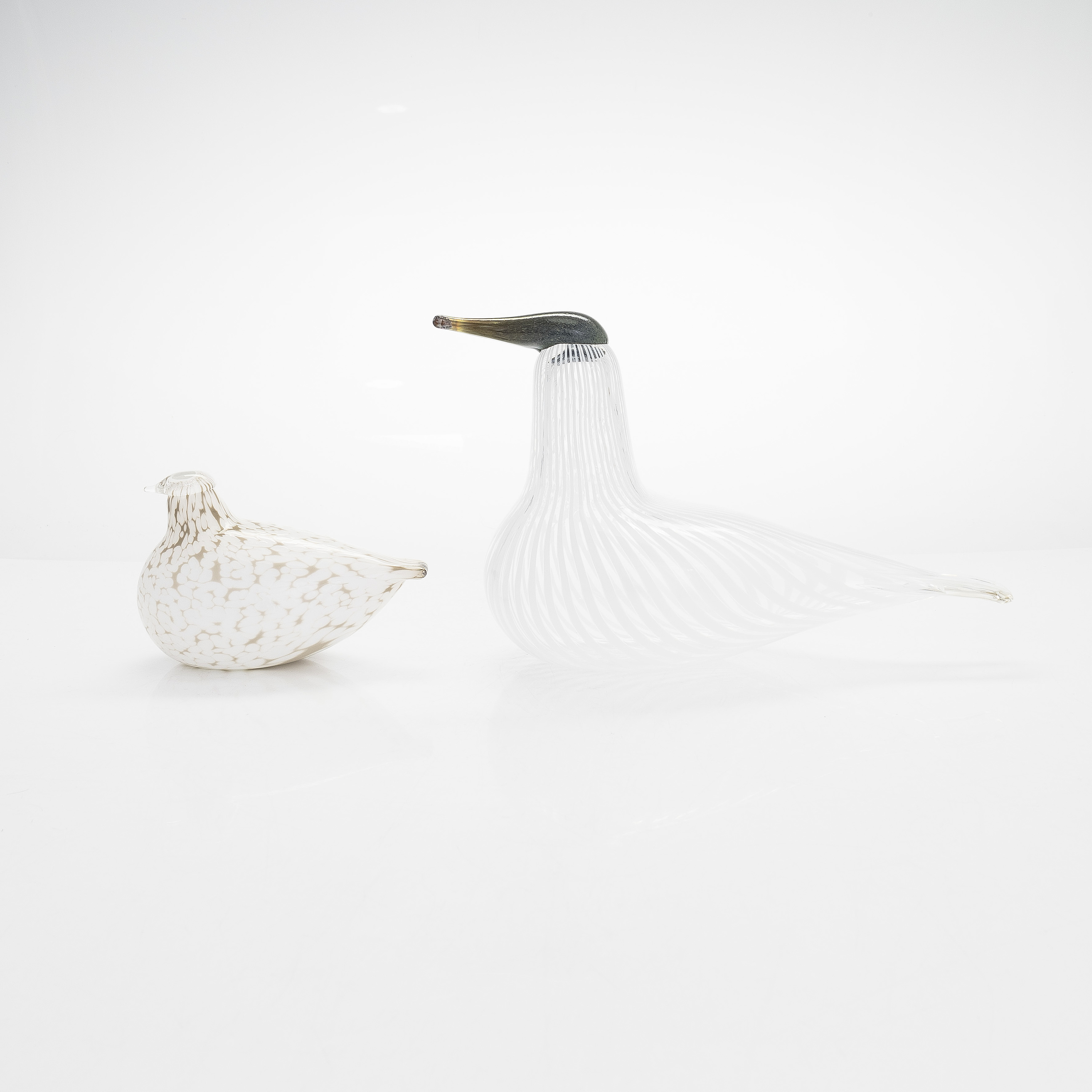 Oiva Toikka, two signed glass birds, incl. the Jubilee Bird for Finland ...