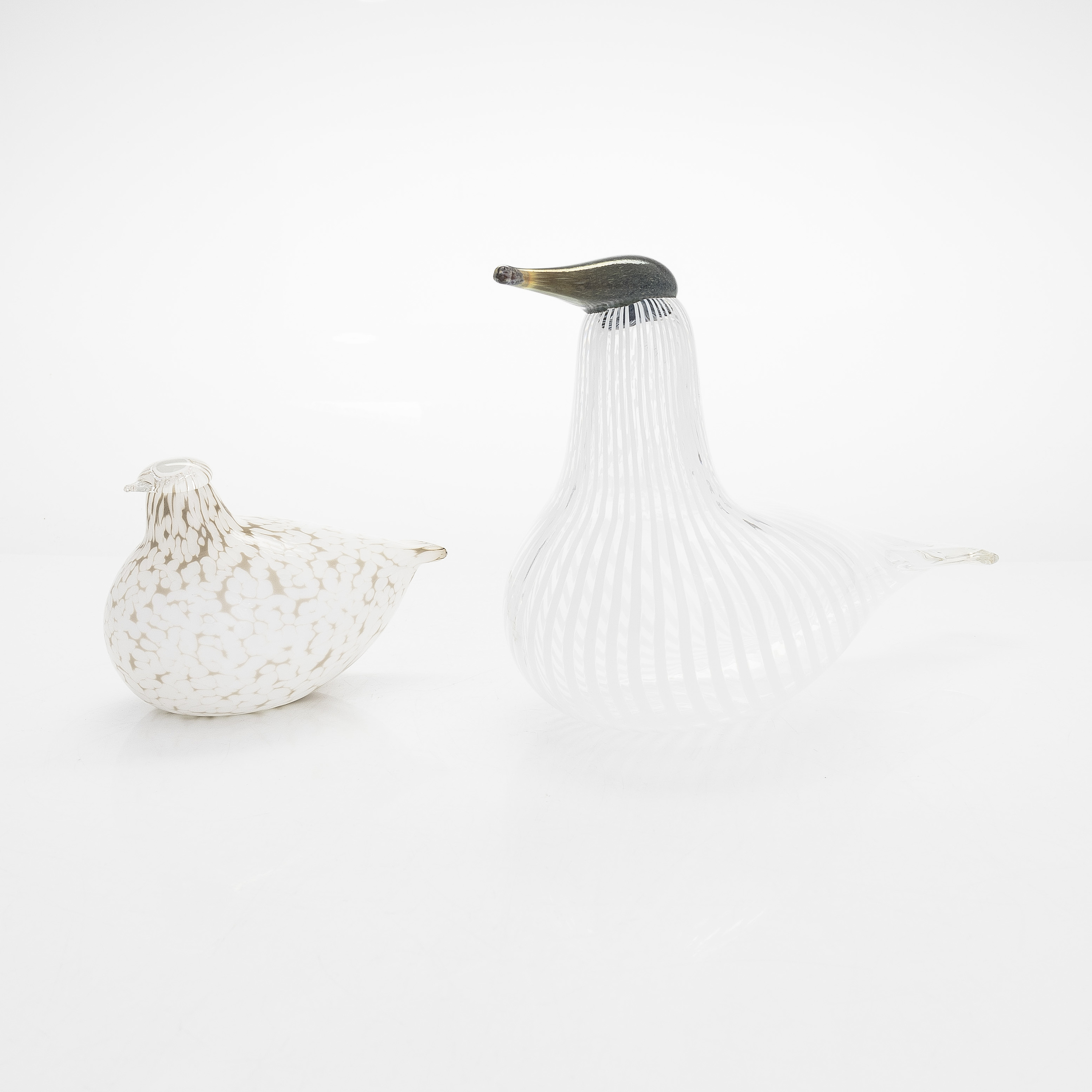Oiva Toikka, two signed glass birds, incl. the Jubilee Bird for Finland ...