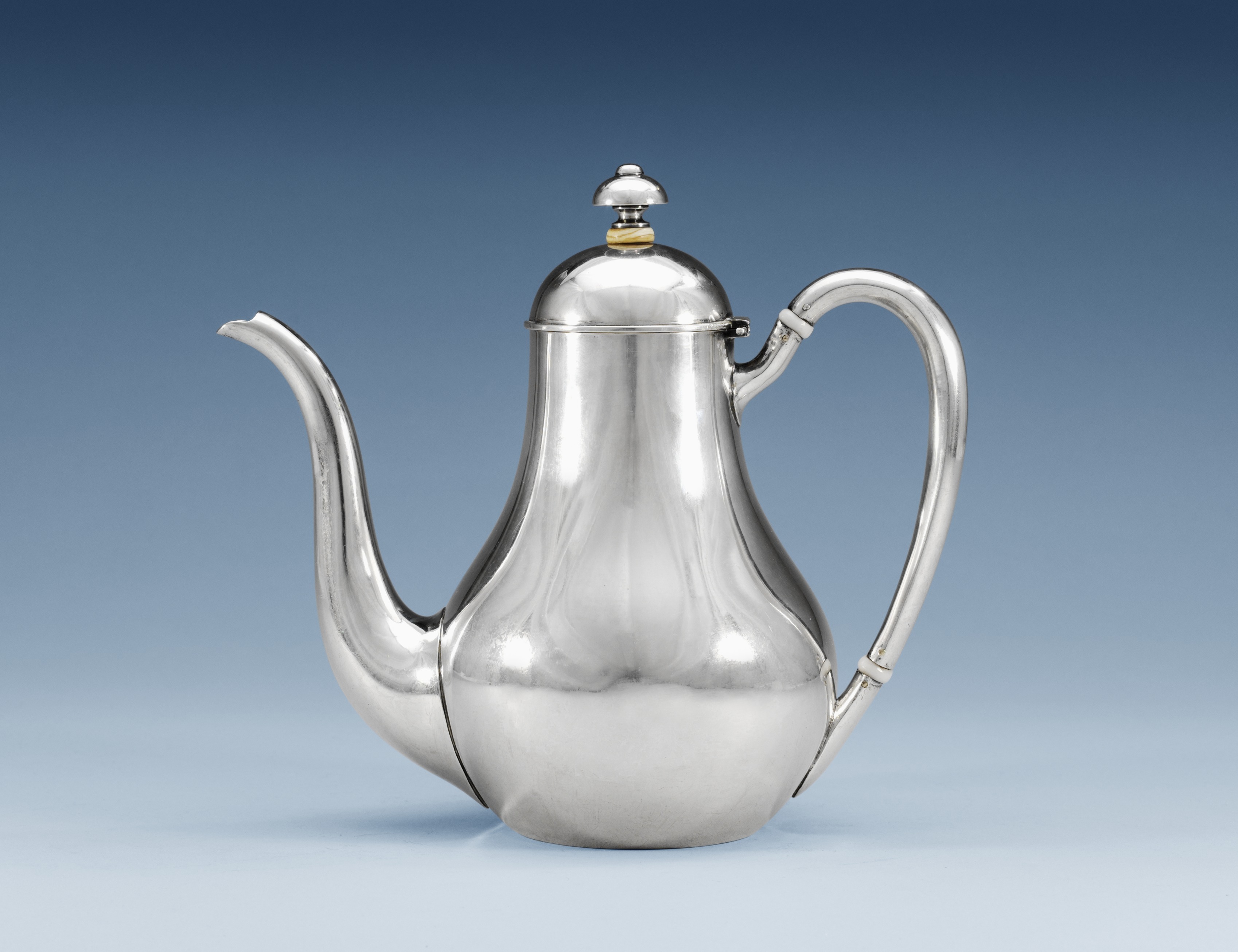 A RUSSIAN PARCEL-GILT TEA-POT, makers mark of Nichols & Plinke, St ...