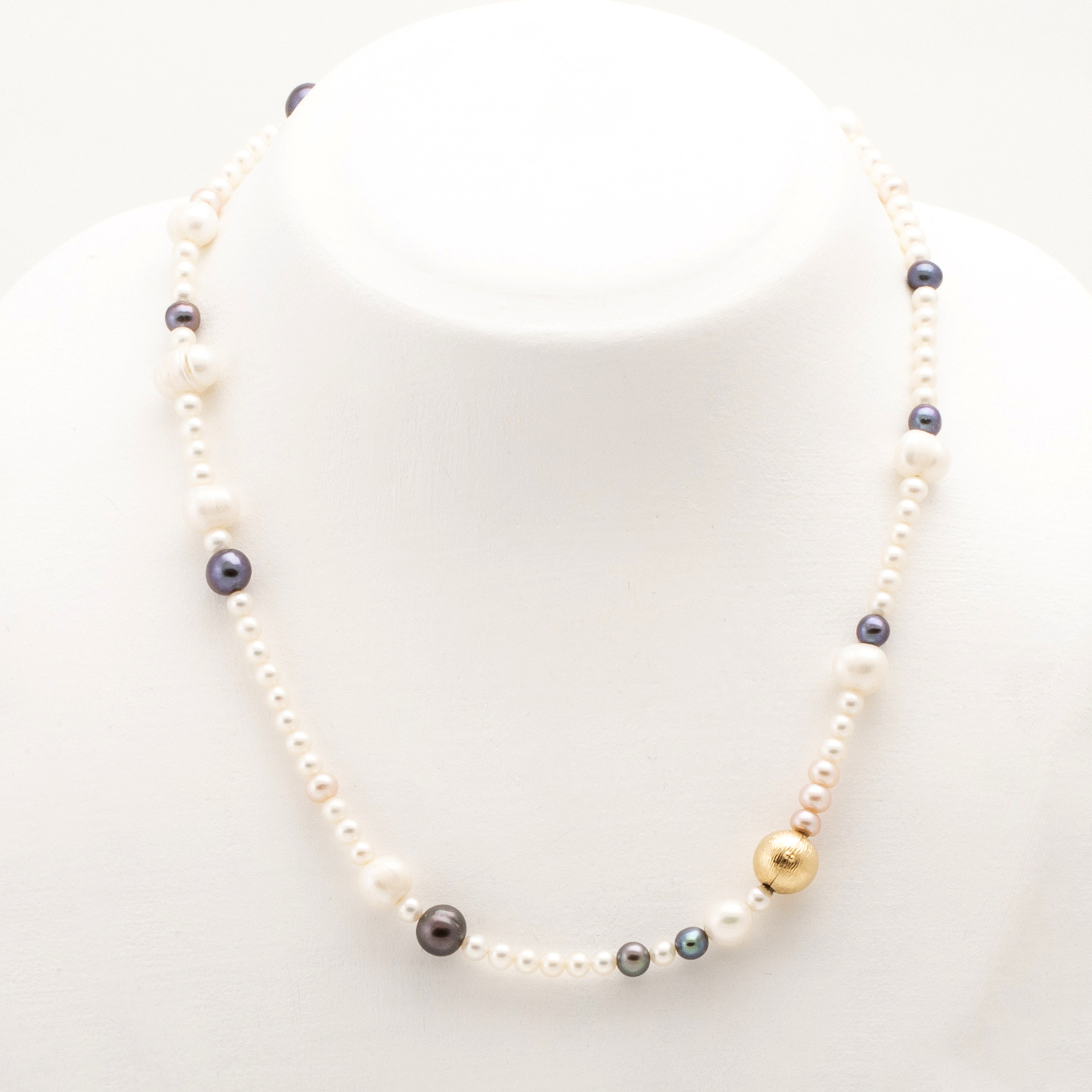 Ole Lynggaard, two cultured pearls necklaces and a bracelet with 18K ...