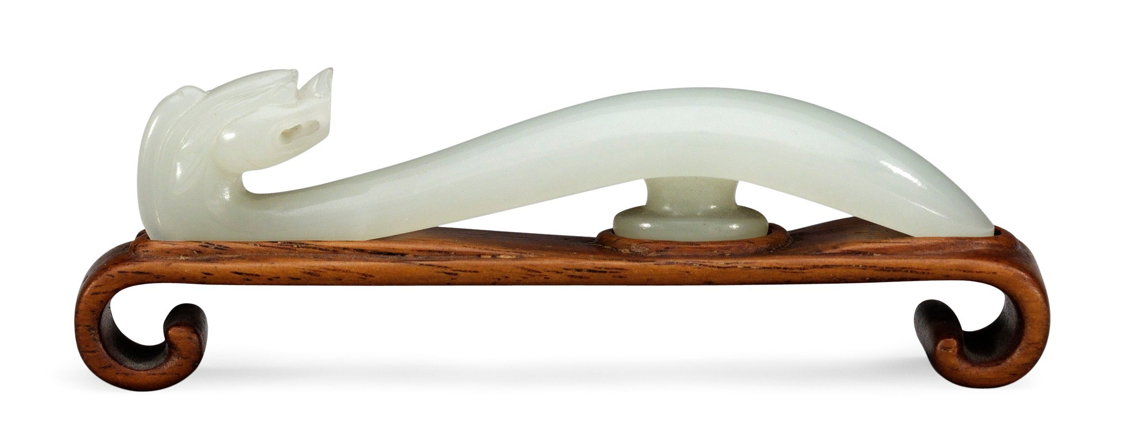 A Chinese jade belt clasper. - Bukowskis