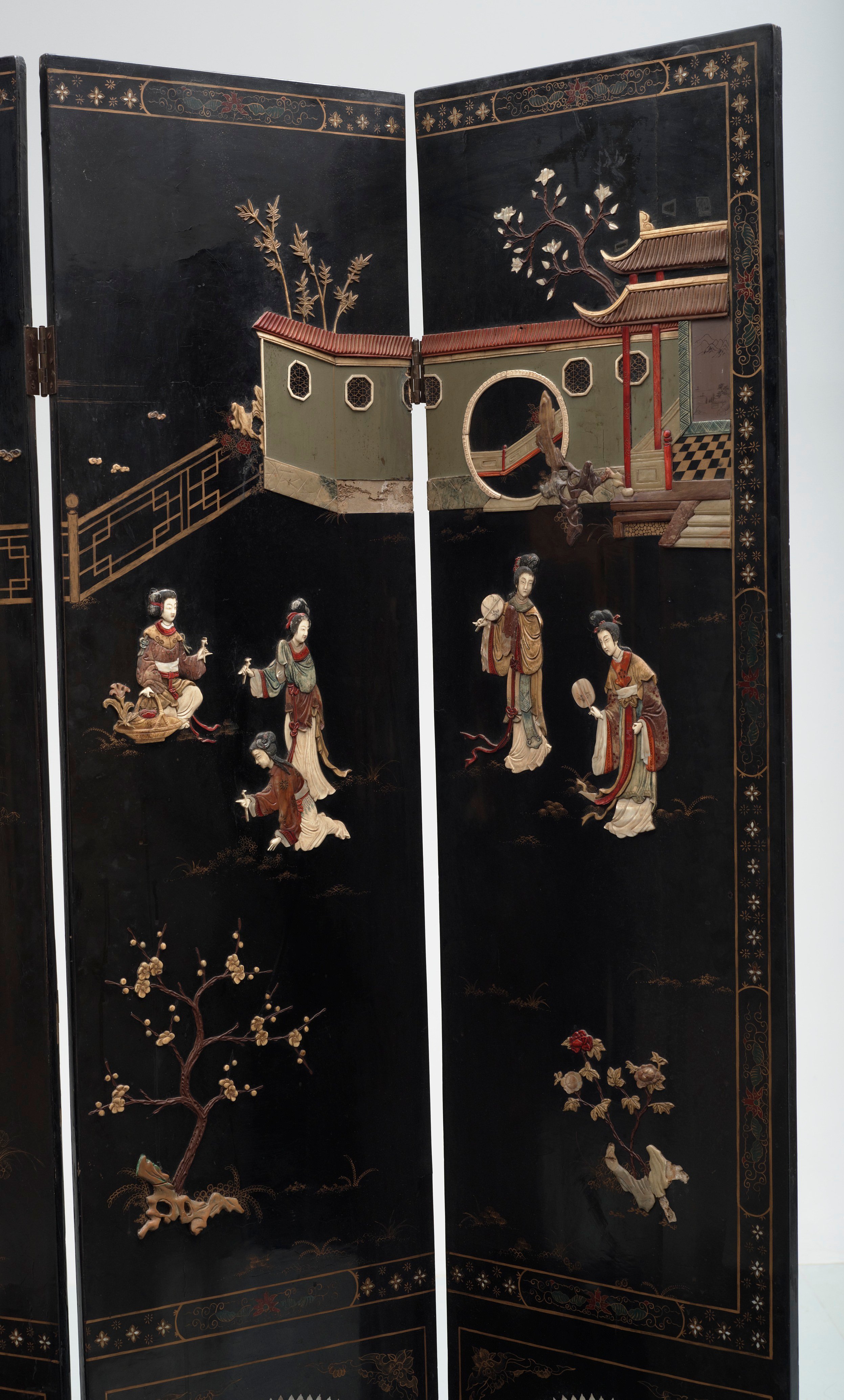 A chinese black lacquer six-panel screen, early 20th Century, with ...