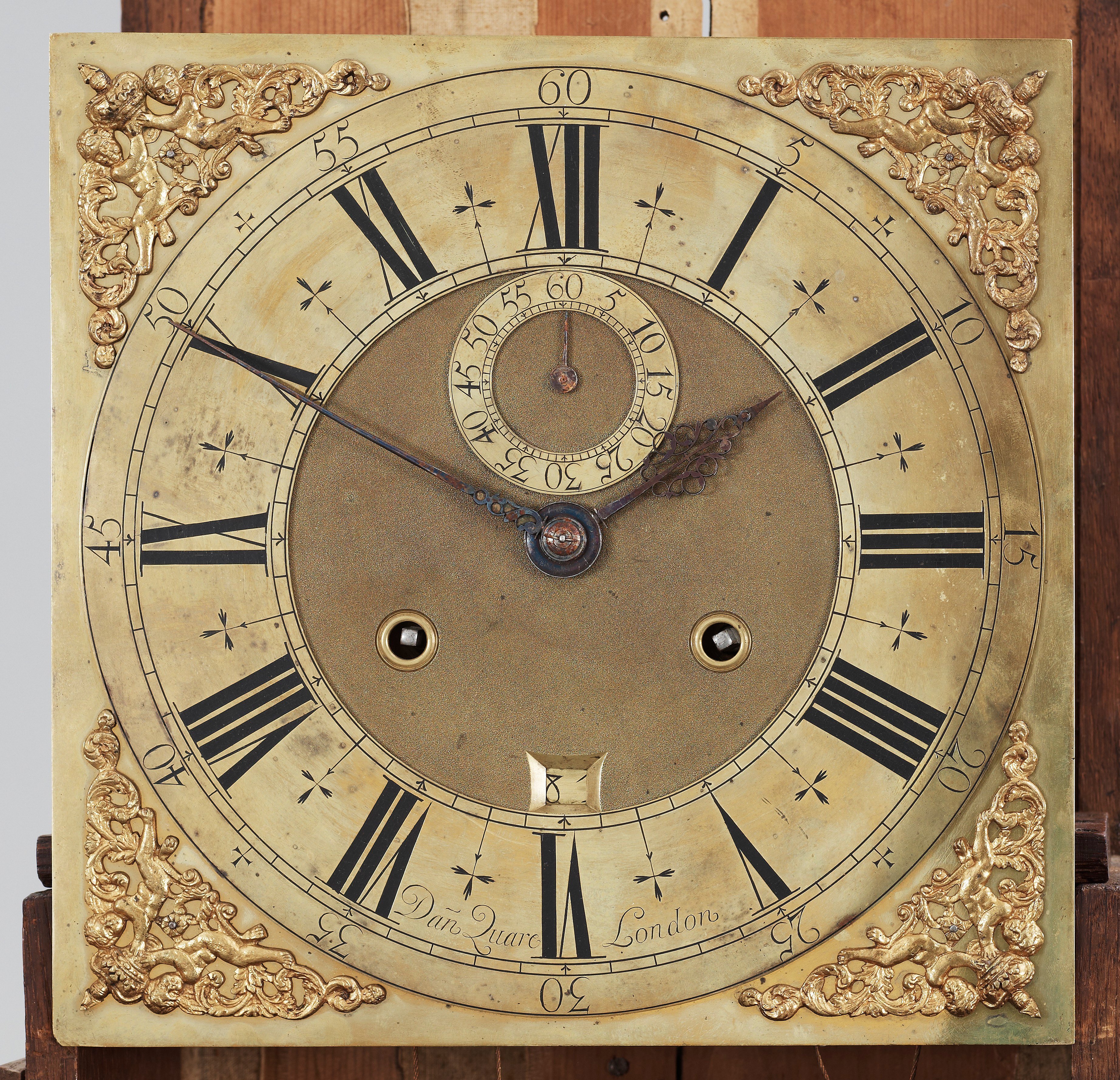 A Queen Anne walnut month-going longcase clock by Daniel Quare, London ...
