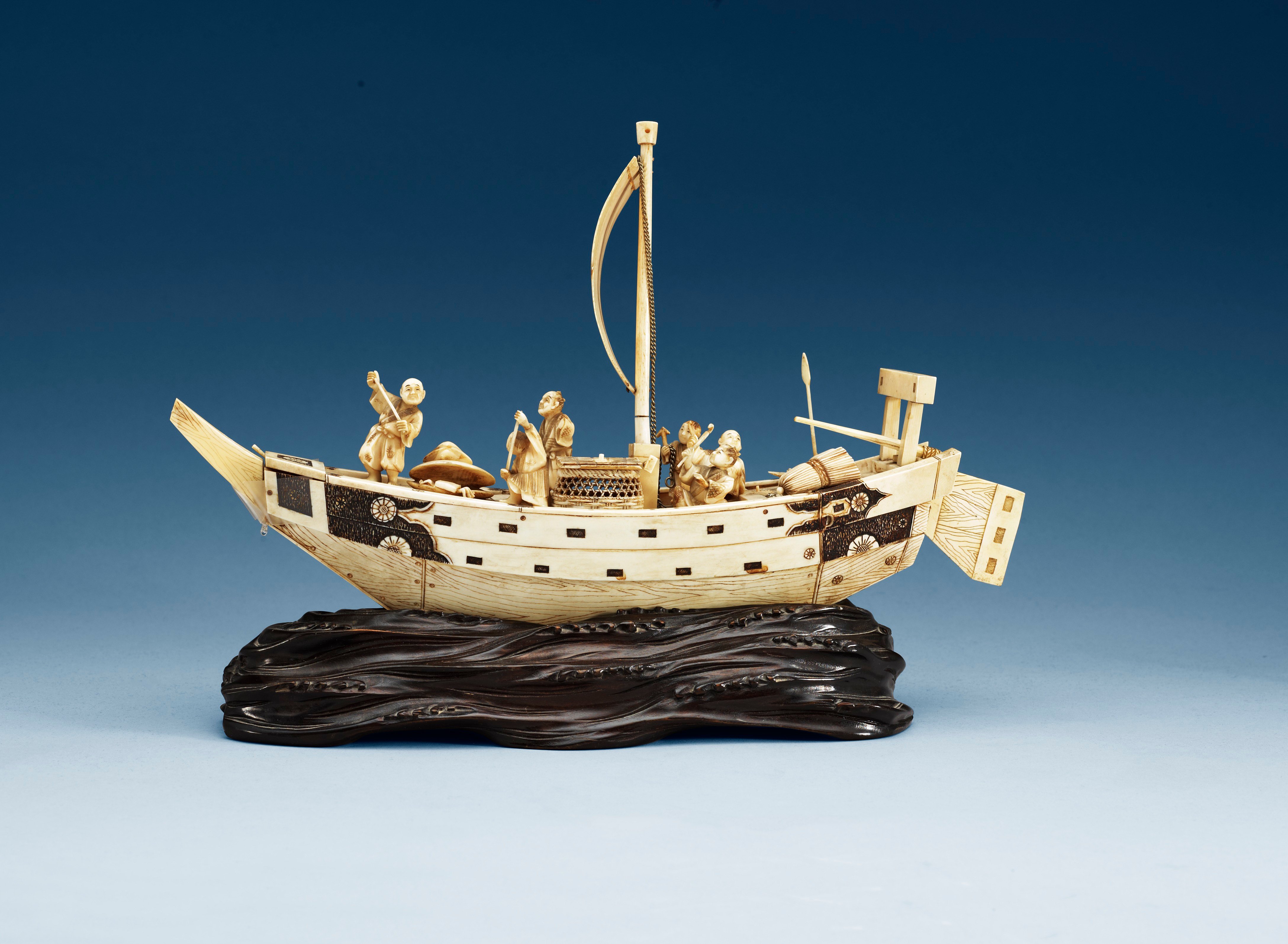 A Japanese ivory model of a ship with fishermen, Meiji period ca 1900 ...