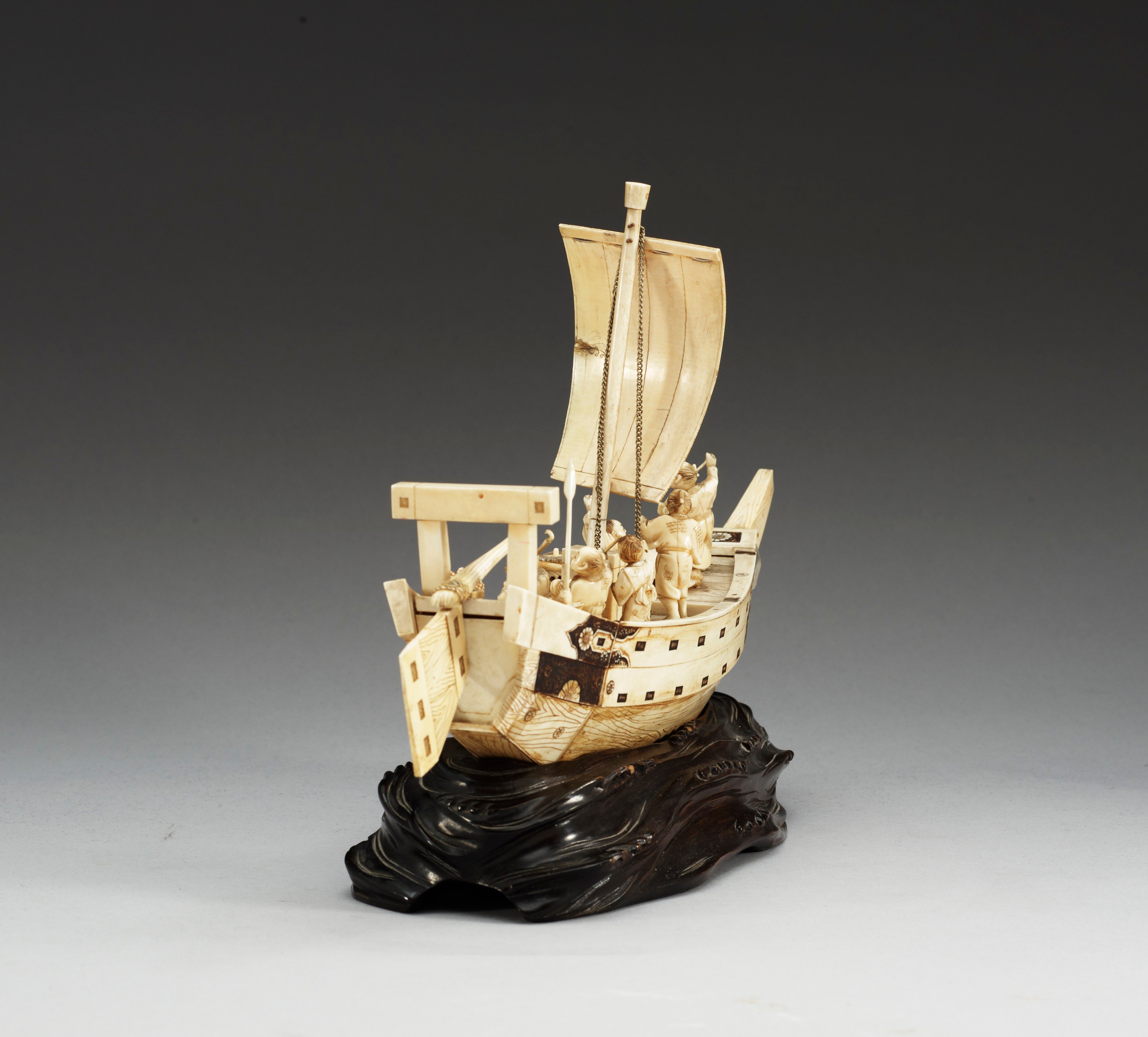 A Japanese ivory model of a ship with fishermen, Meiji period ca 1900 ...