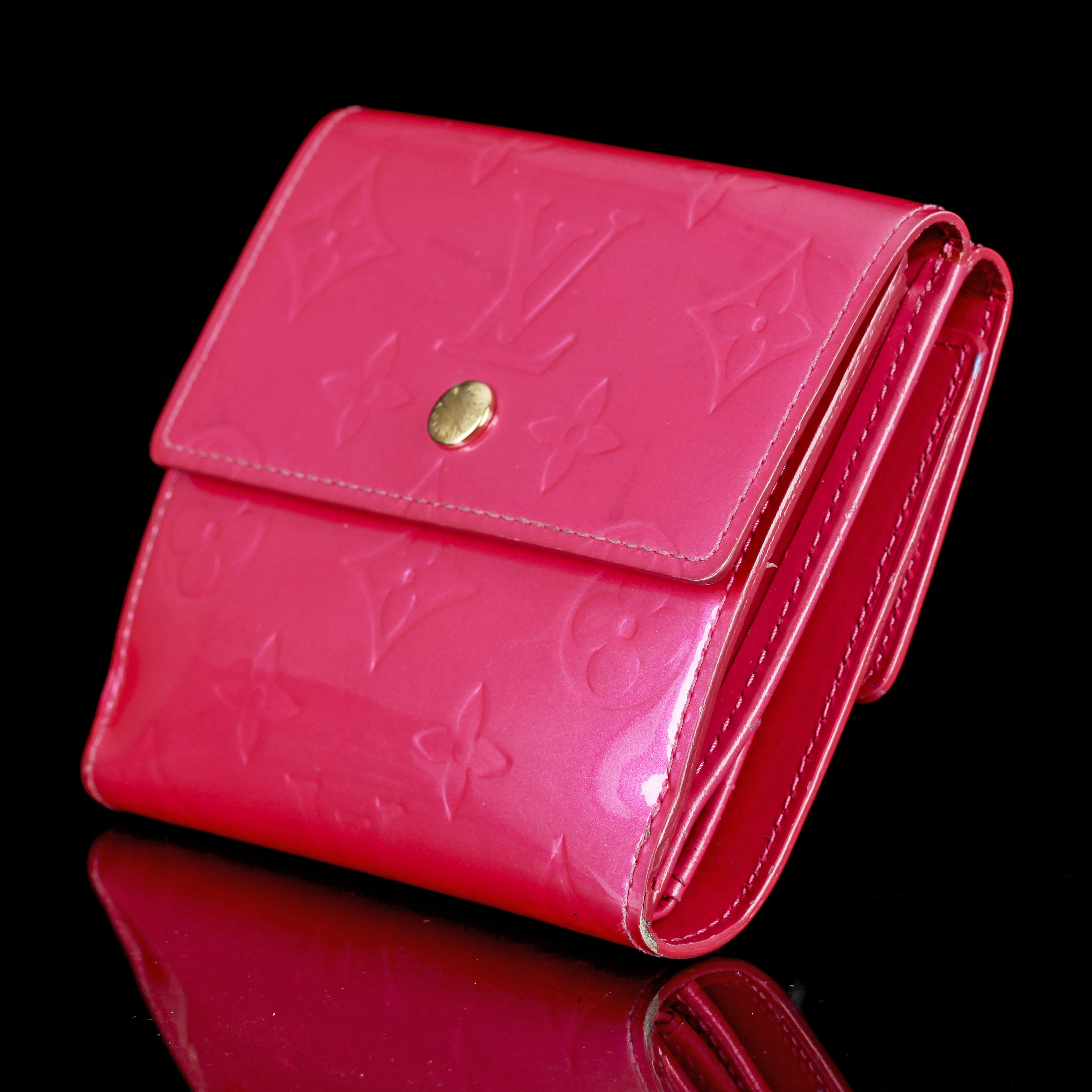 A cerise monogram vernis wallet by Louis Vuitton. - Bukowskis