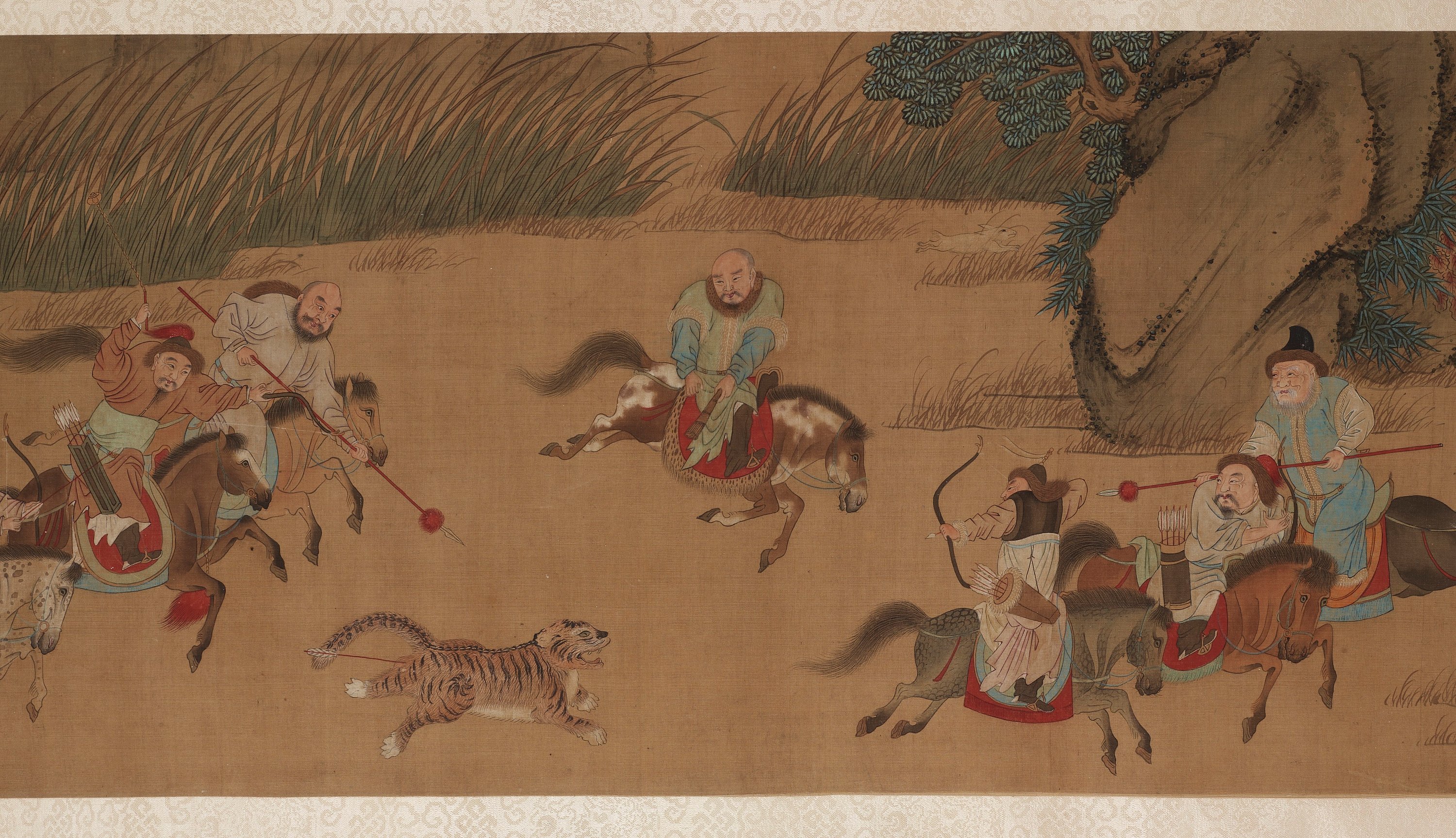 A fine handscroll of hunting scenes and with calligraphy, Qing dynasty ...