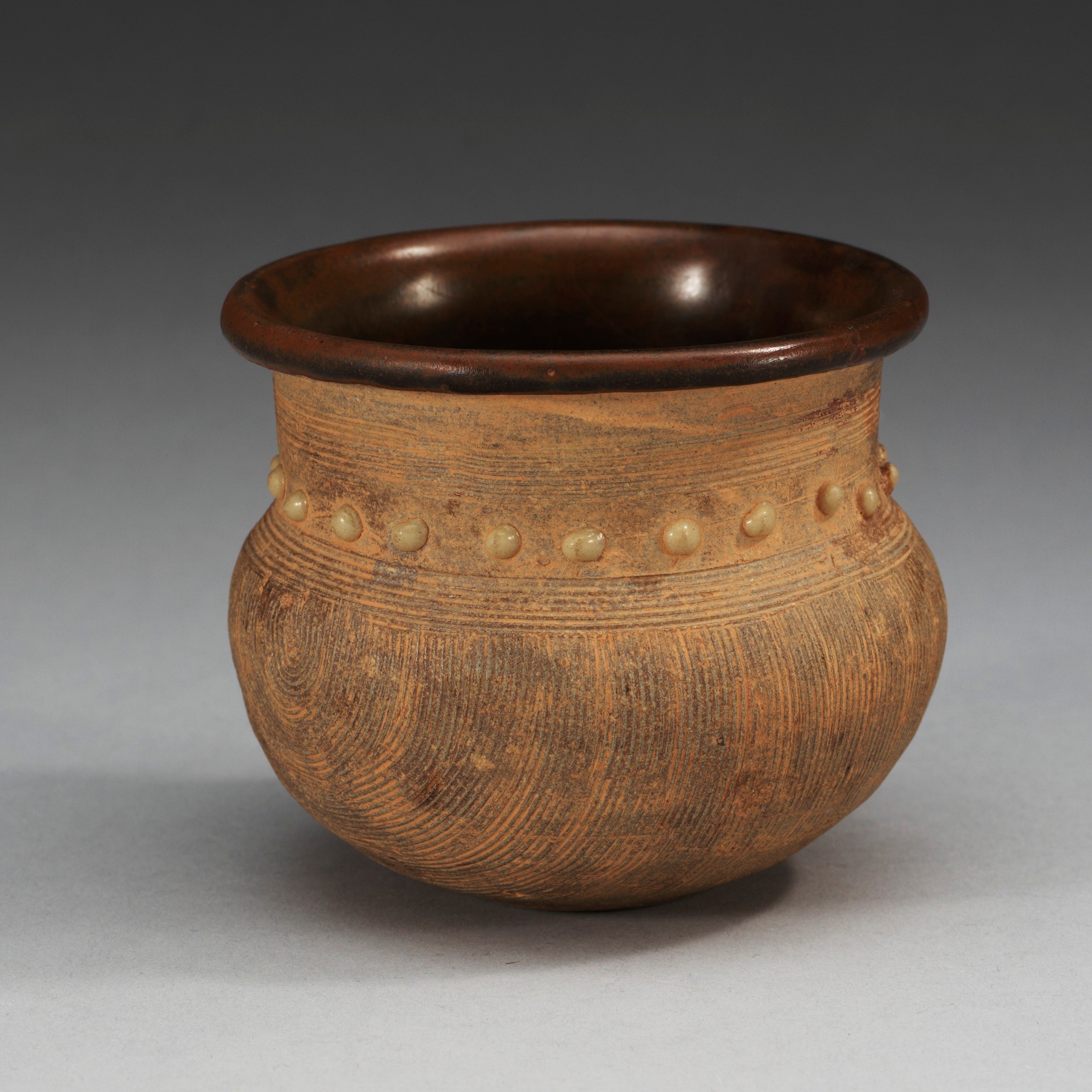 A brown and black glazed rice measurement cup, Song dynasty (960-1279 ...