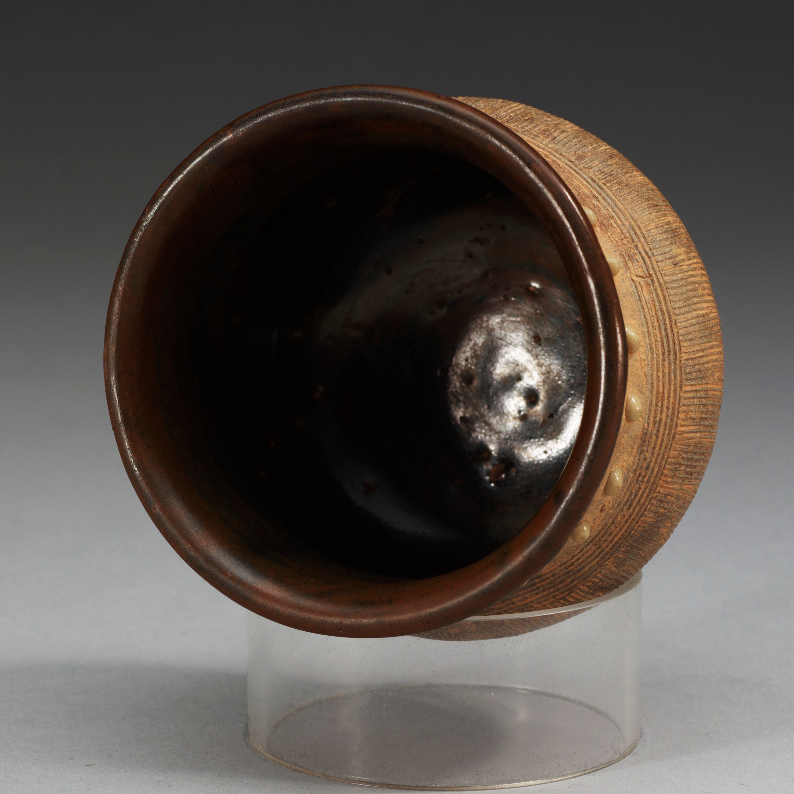 A brown and black glazed rice measurement cup, Song dynasty (960-1279 ...