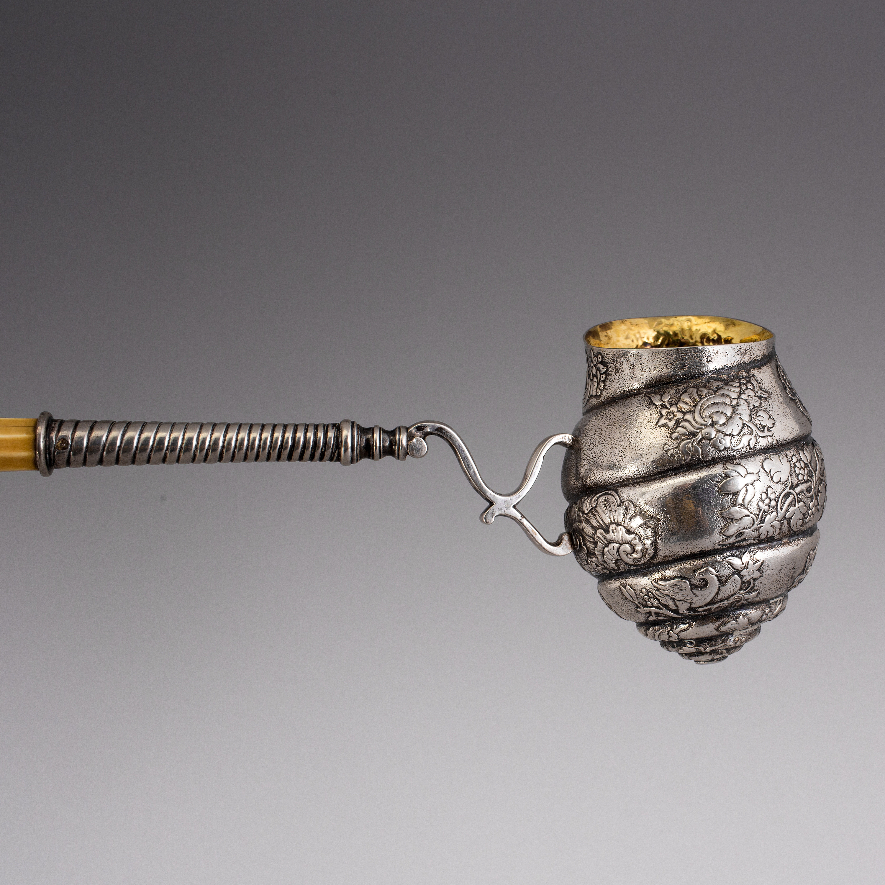 An 18th century parcel-gilt and bone ladle, unmarked. - Bukowskis