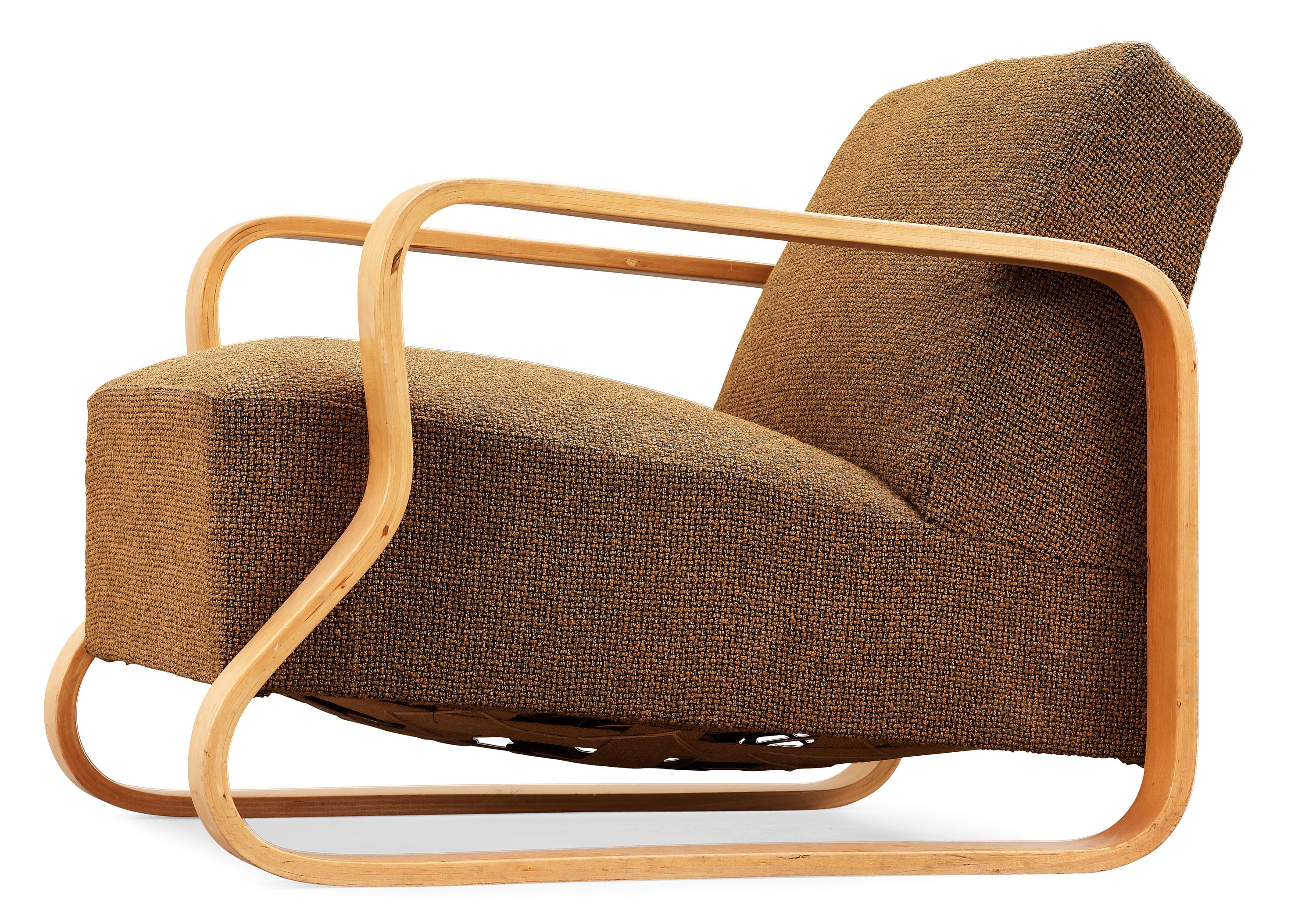 An Alvar Aalto laminated birch 'padded Paimio chair', upholstered in ...