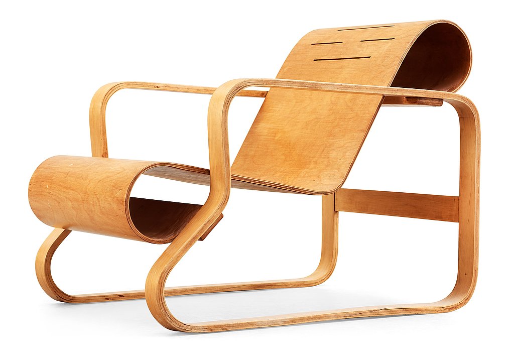An Alvar Aalto laminated birch and plywood armchair, 'Paimio', model 41 ...