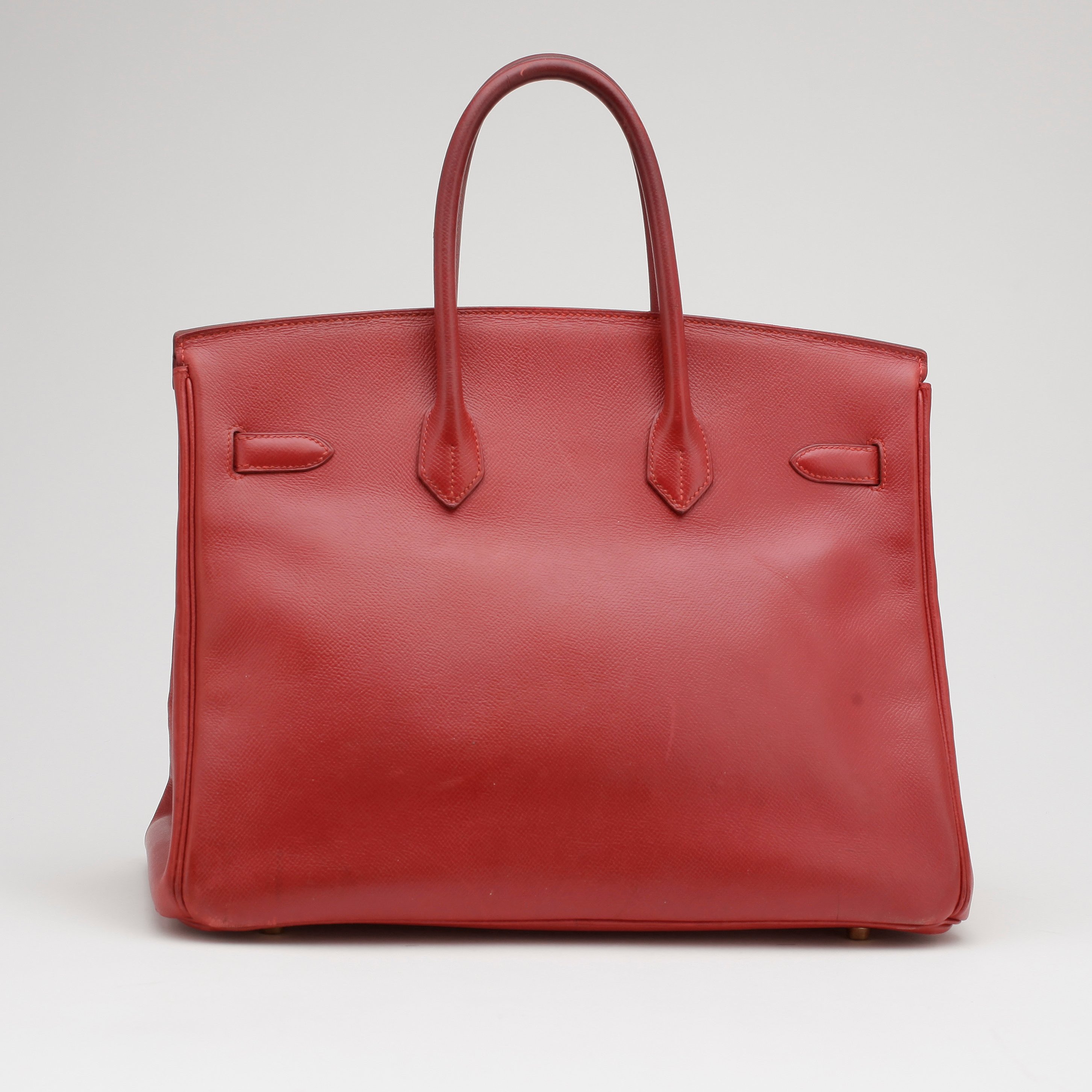 HERMÈS, a raspberry red leather "Birkin 35" bag. - Bukowskis