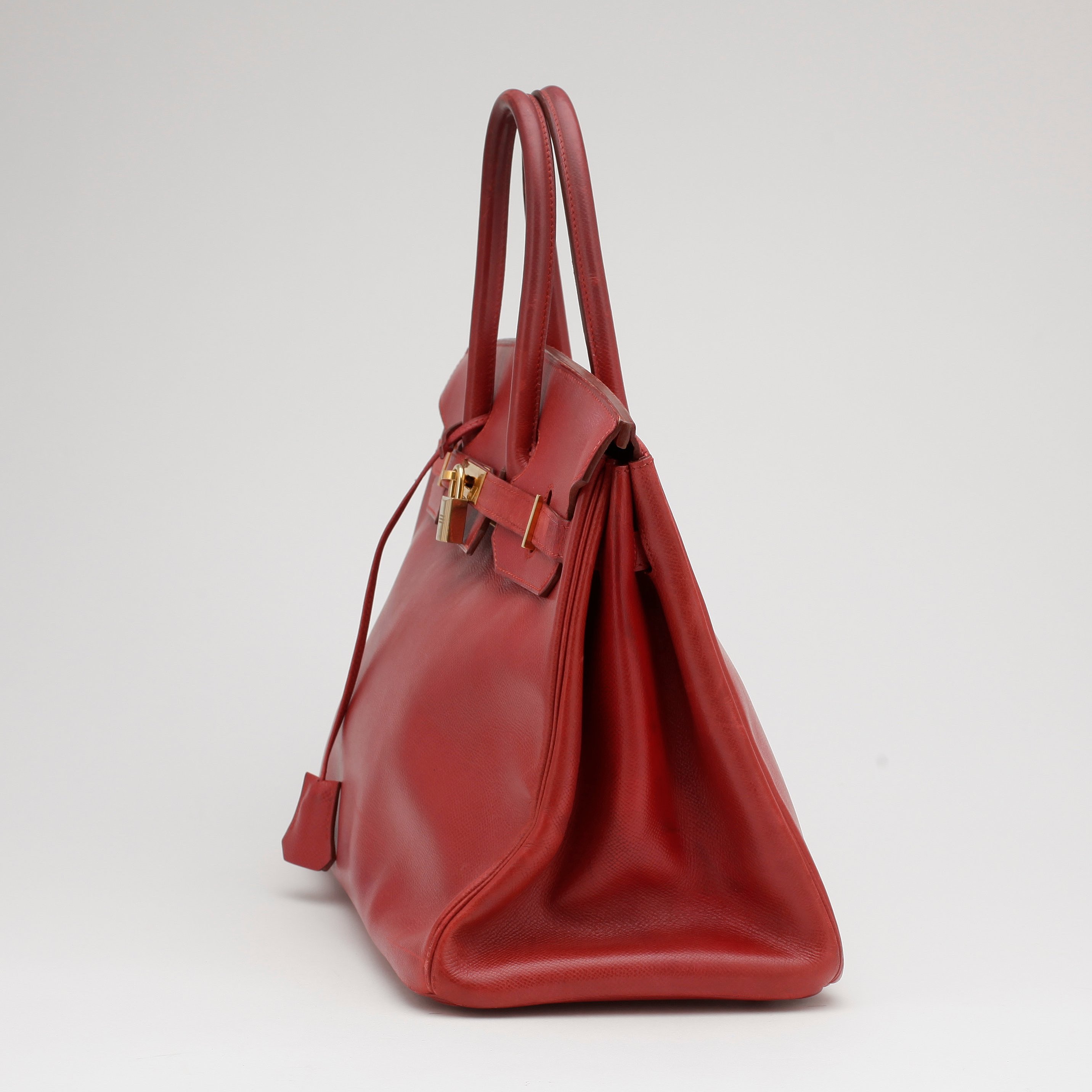 HERMÈS, a raspberry red leather "Birkin 35" bag. - Bukowskis