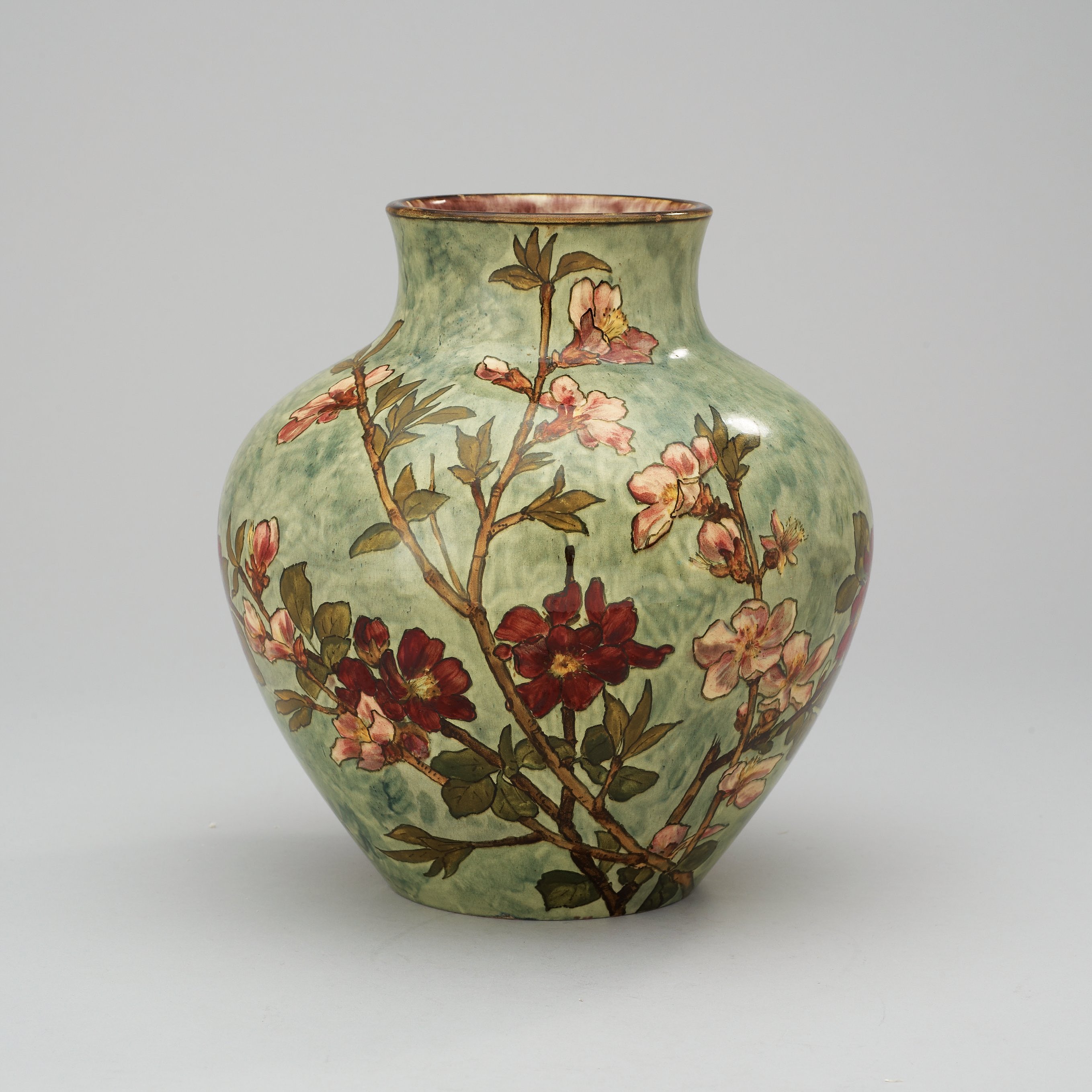 A John Bennett art pottery vase, painted with cherry blossom branches ...