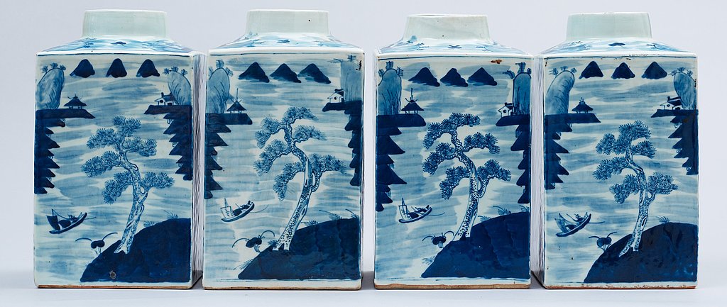 A set of four blue and white large tea caddies in a wooden box, Qing ...