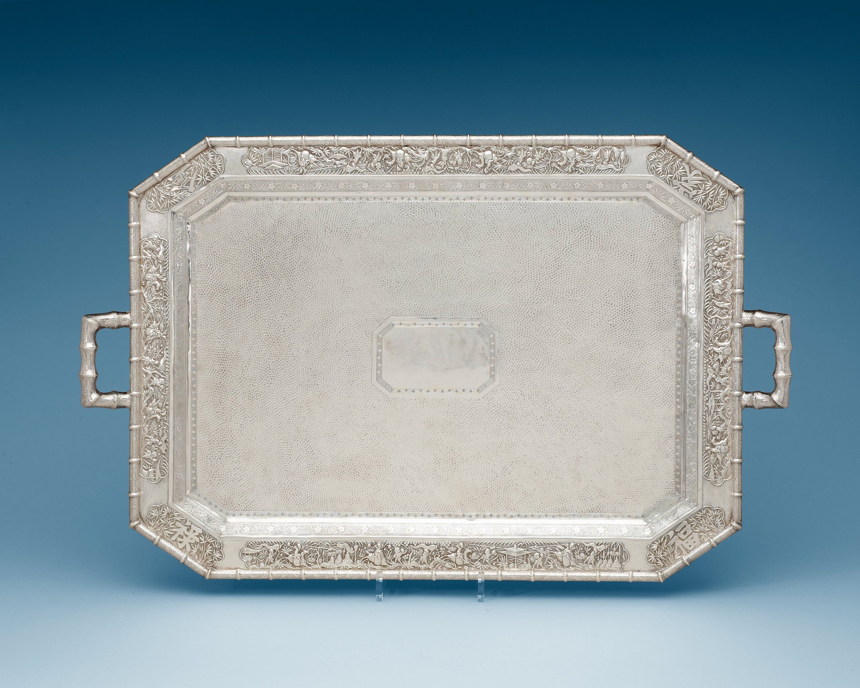 A large silver tray, late Qing dynasty (1644-1912). Marks of Gan Mao ...