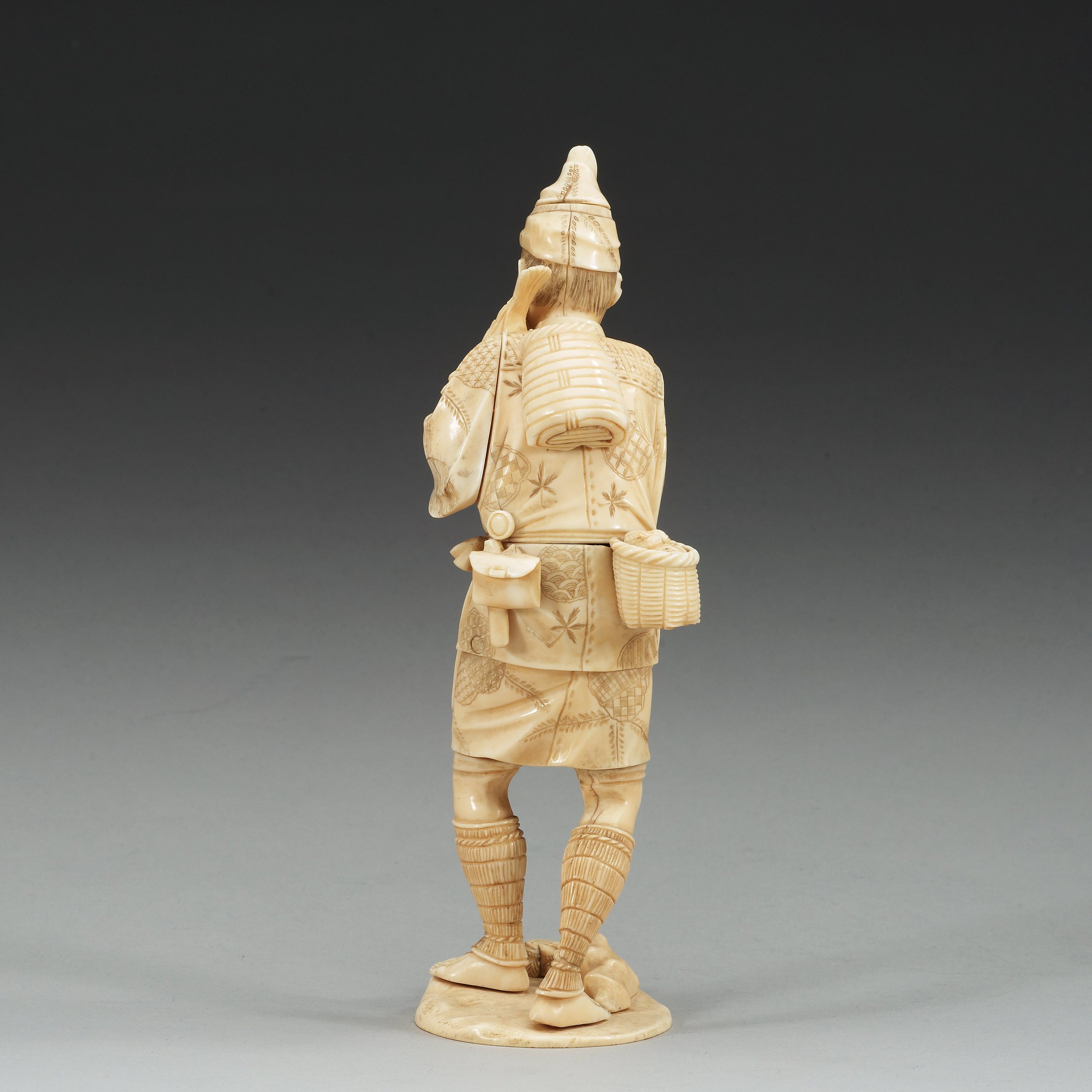 A Japanese ivory figure of a man, Meiji (1868-1912). - Bukowskis