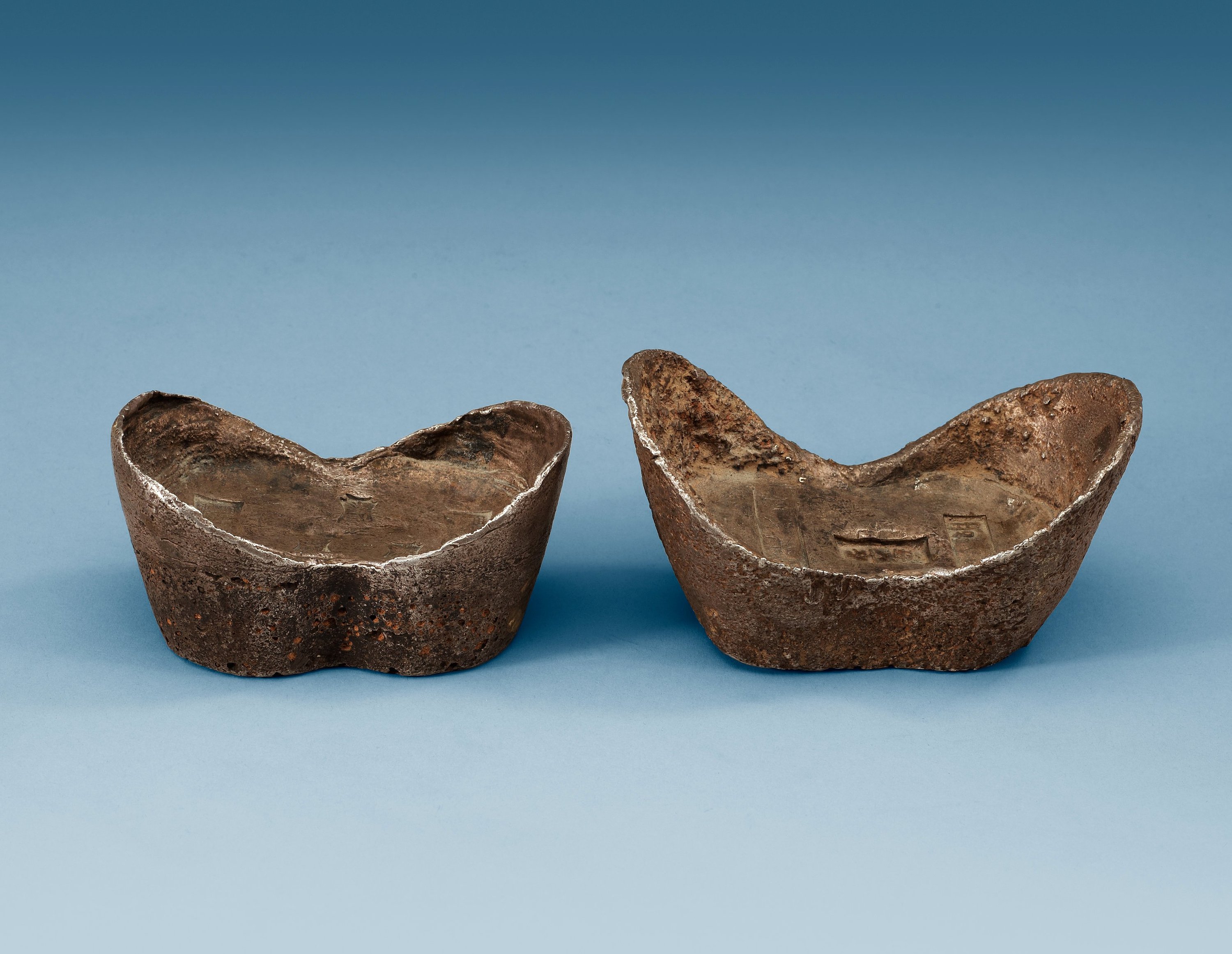 Two large silver ingots, Qing dynasty (1644-1912). - Bukowskis