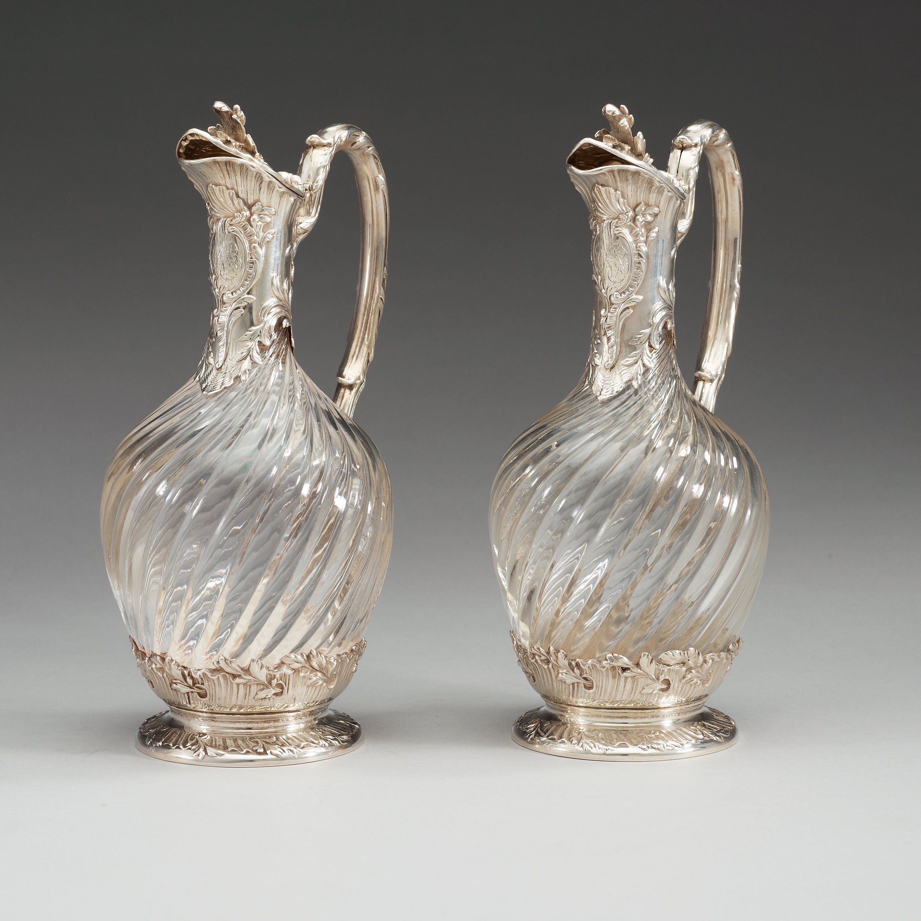 A pair of French late 19th century silver and glass wine-flagons ...
