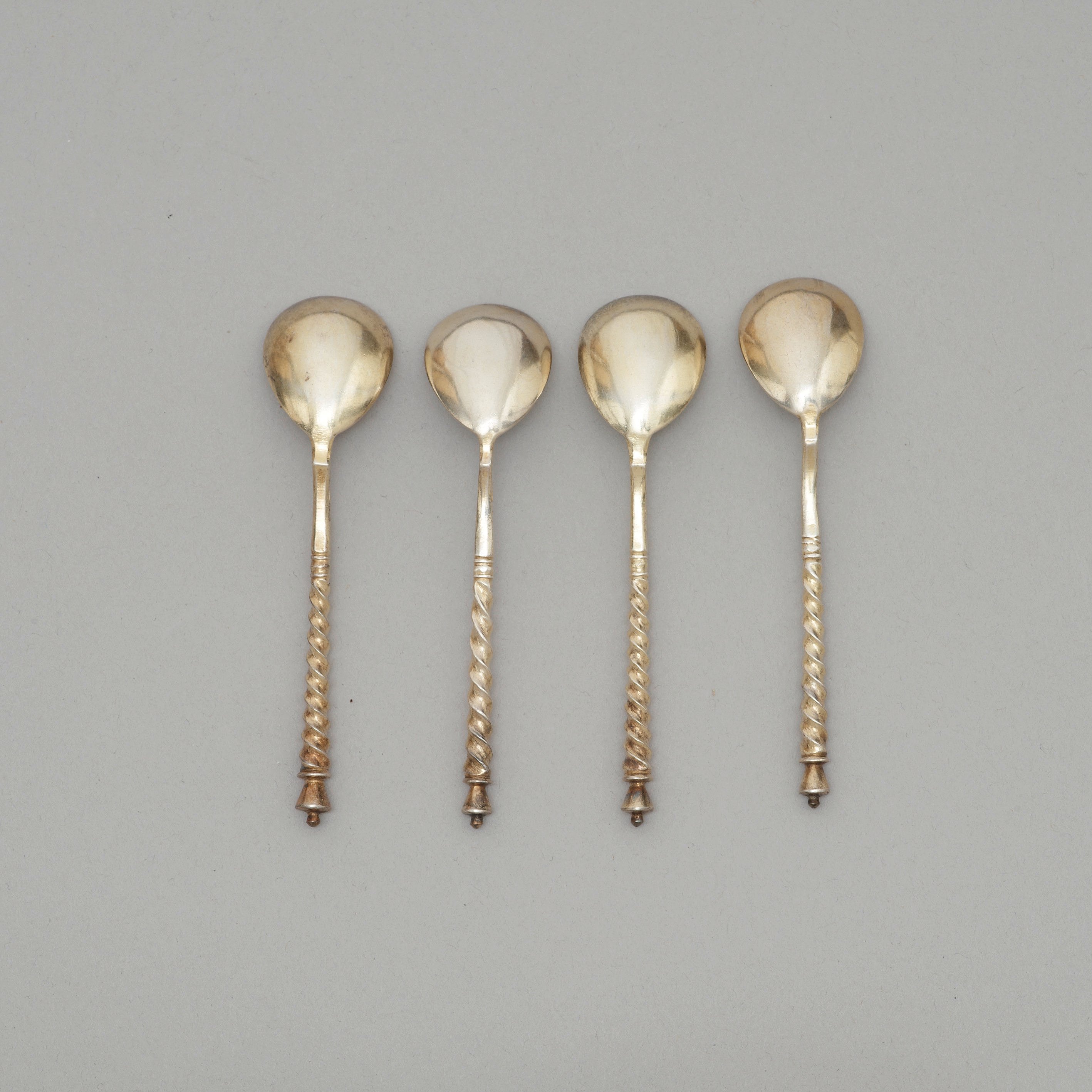 A set of four Russian silver-gilt coffee-spoons, marks of Samuel Z ...