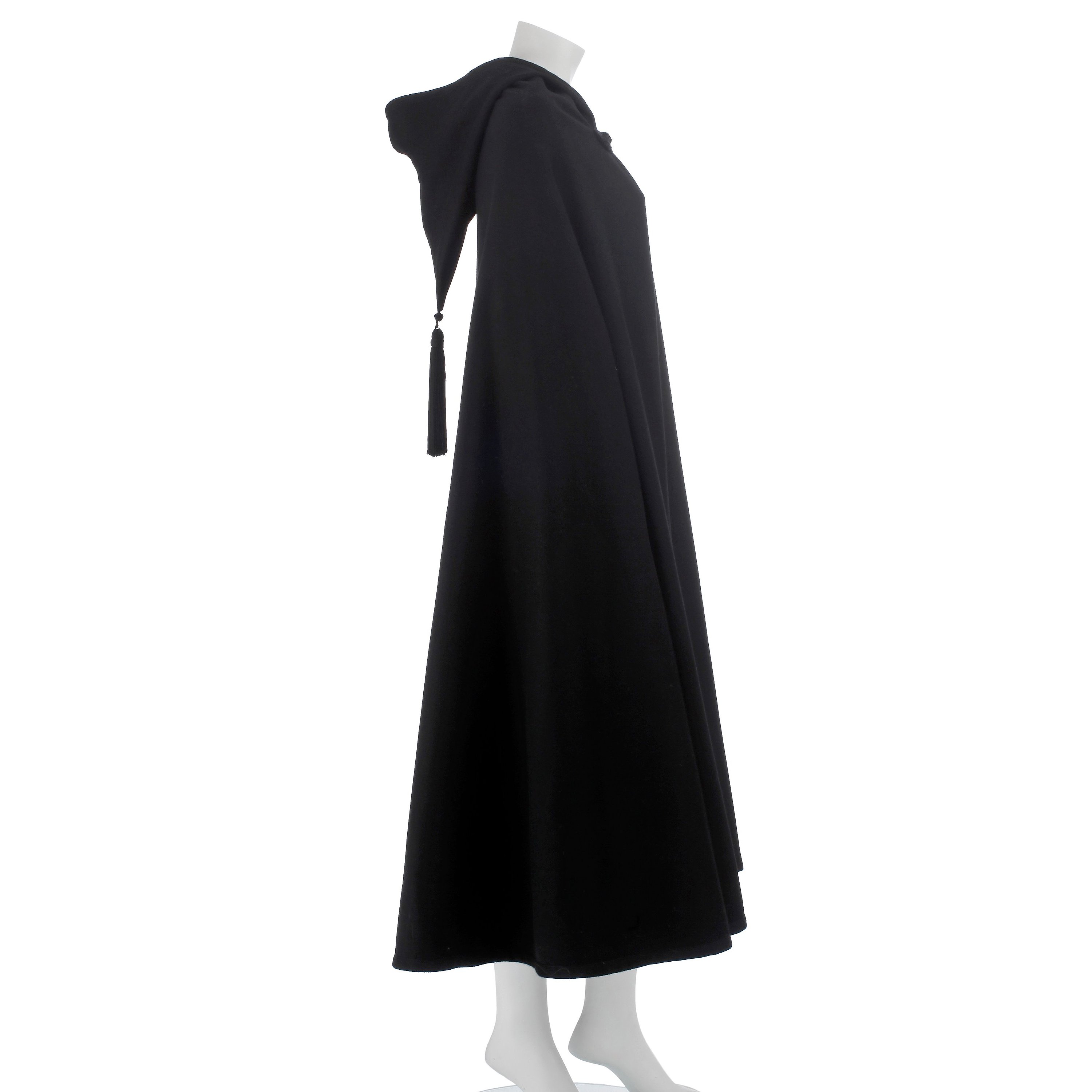 YVES SAINT LAURENT, a black wool cape with hood. . - Bukowskis