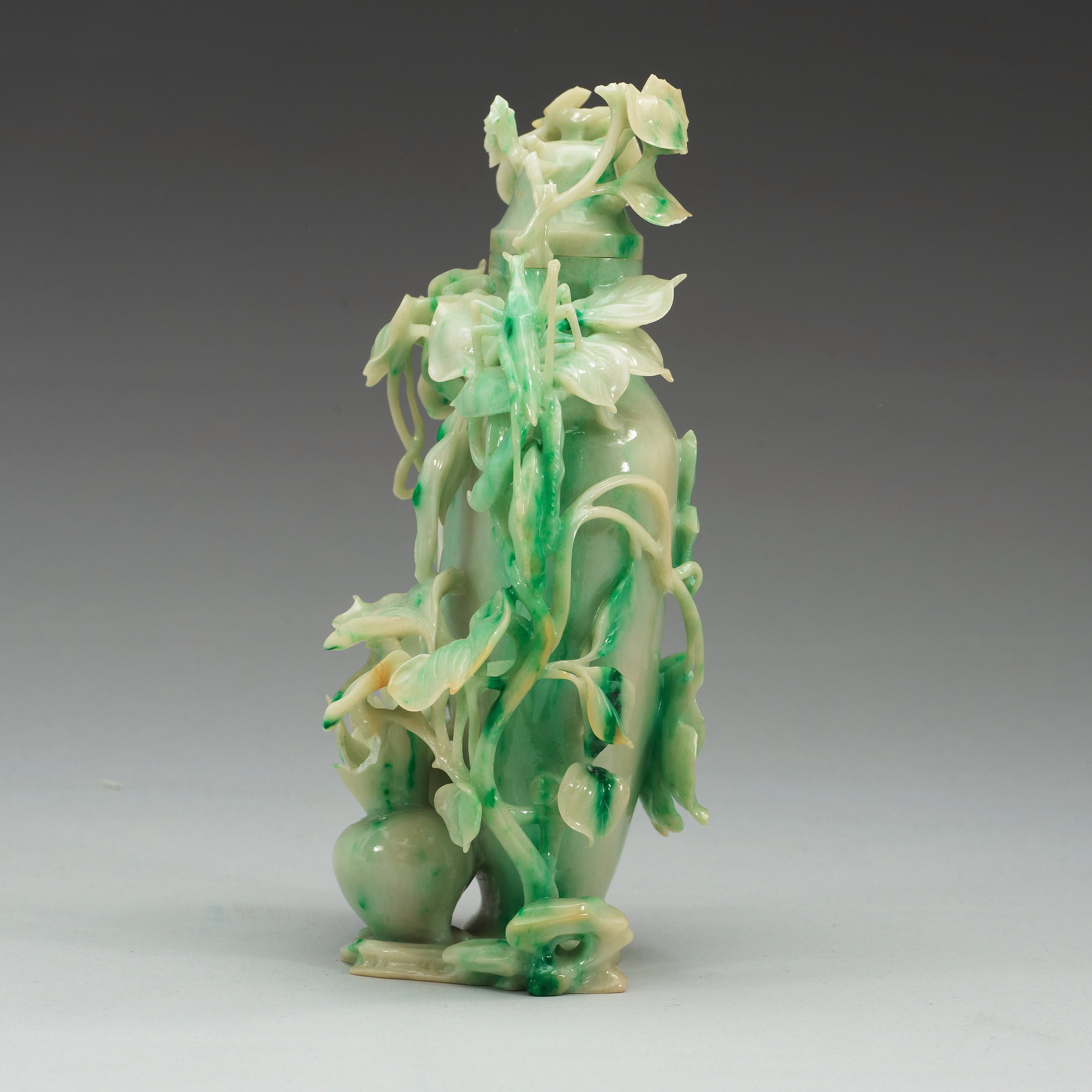A Chinese elaborately carved nephrite vase with cover, 20th Century ...