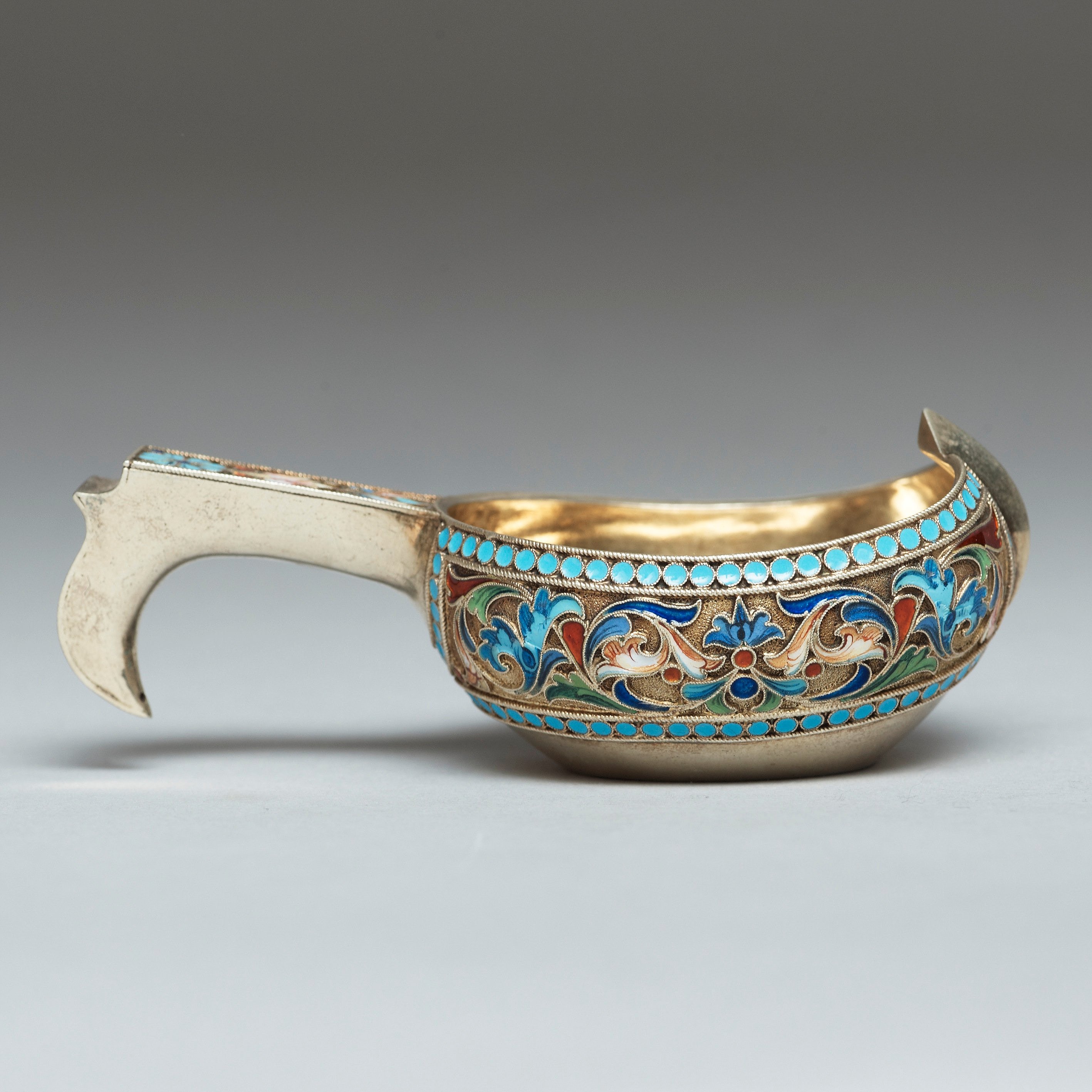 A Russian early 20th century silver-gilt and enamel, makers mark of ...