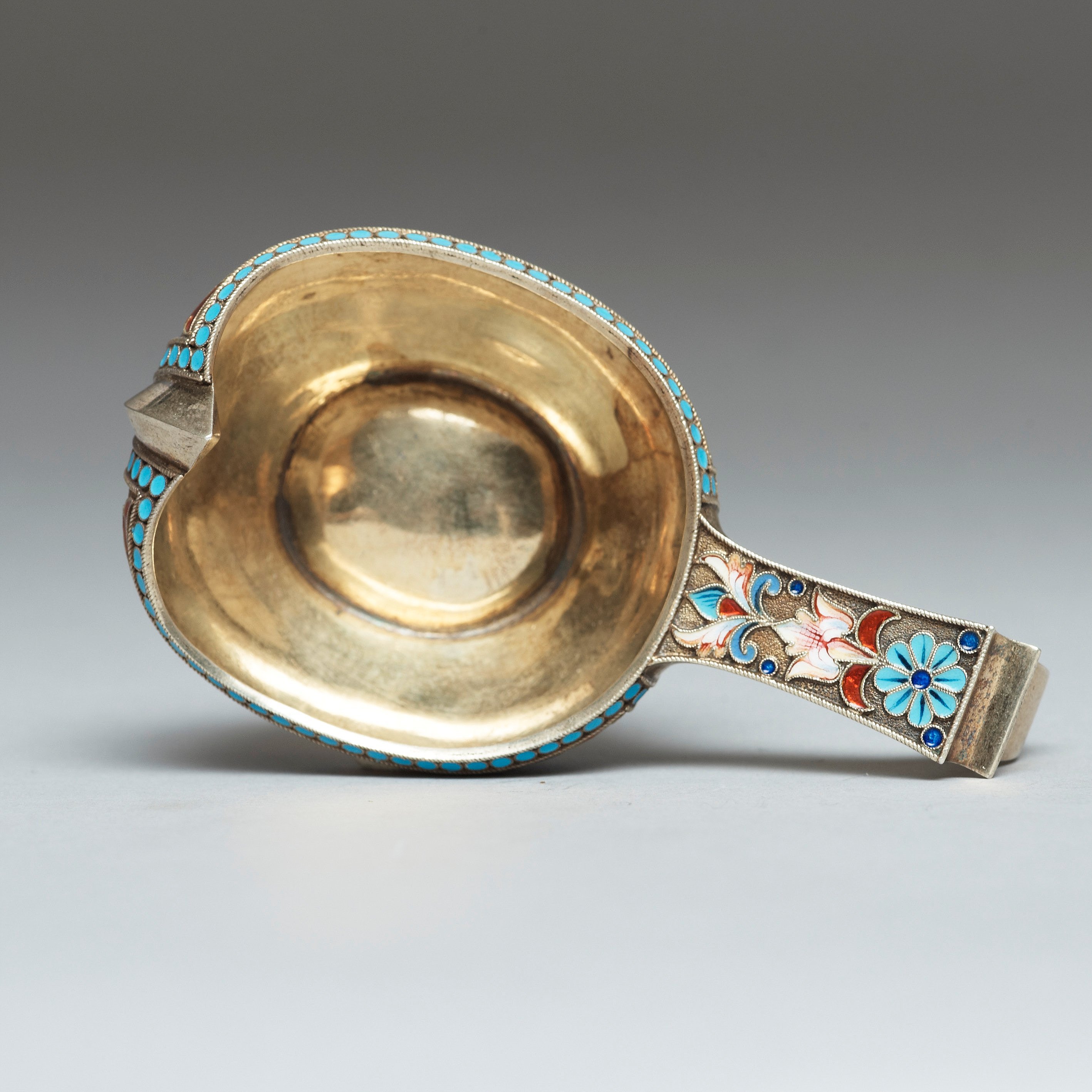 A Russian early 20th century silver-gilt and enamel, makers mark of ...