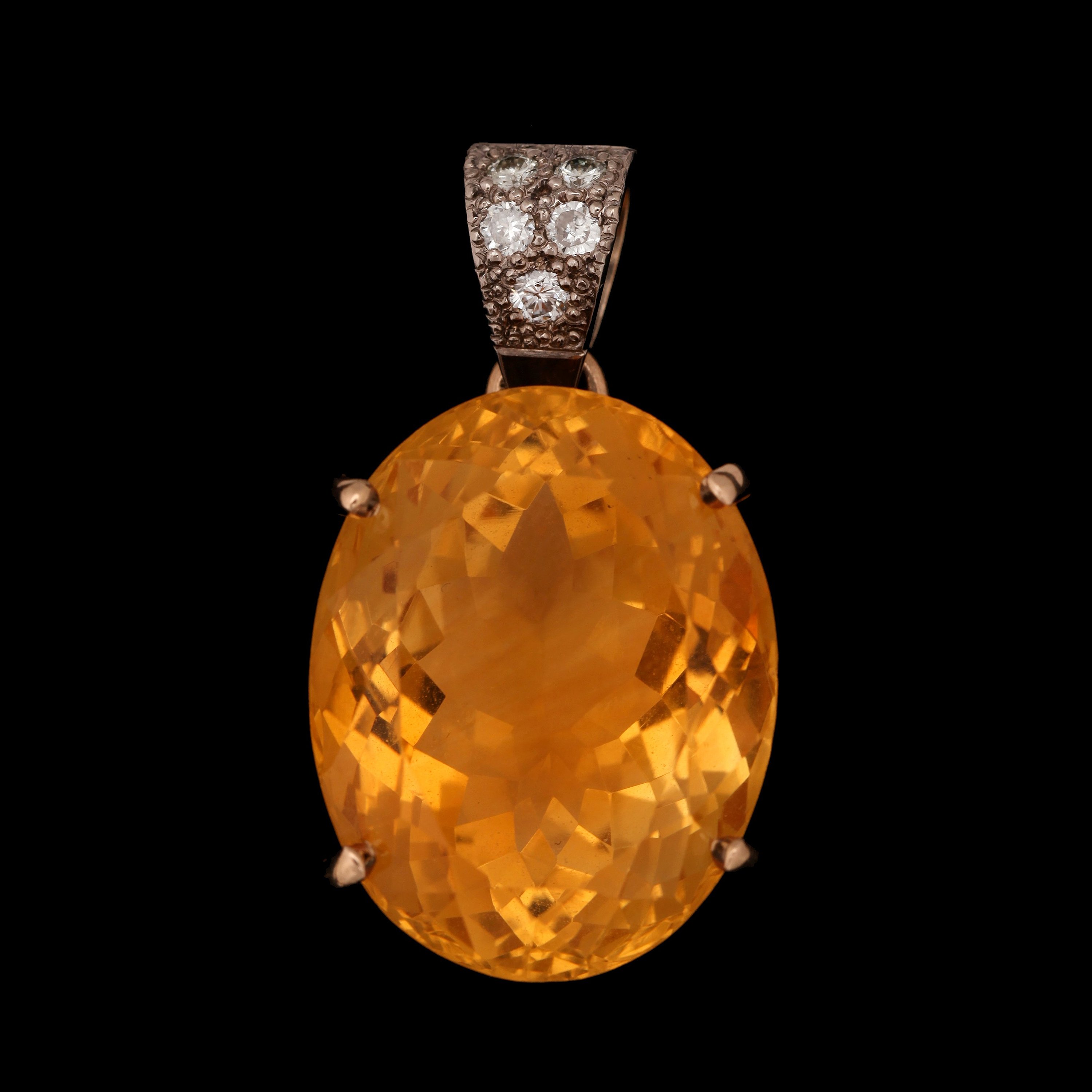 A citrin pendant, 47.50 ct, set with brilliant cut diamonds, tot. app ...