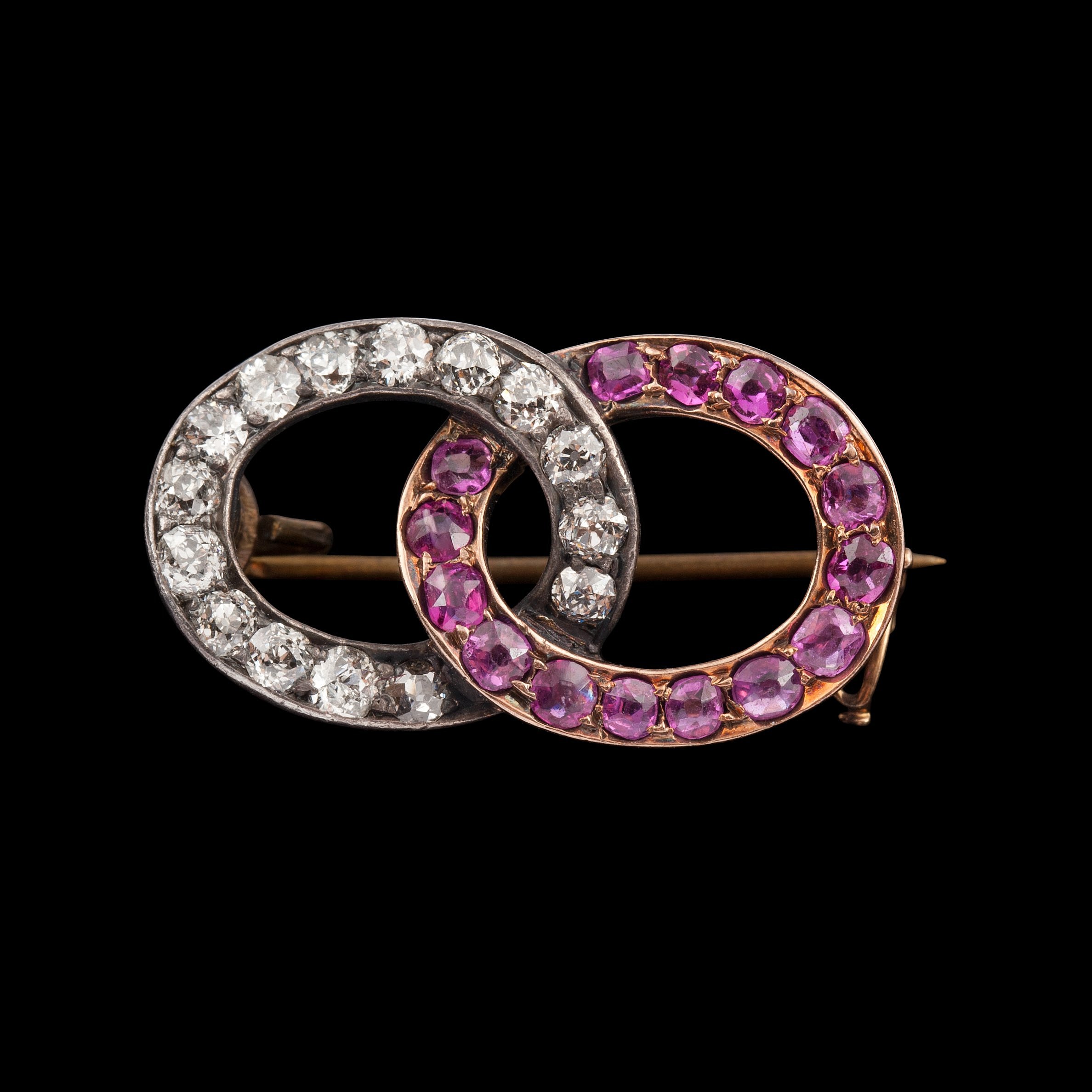 A single cut diamond and ruby brooch. - Bukowskis