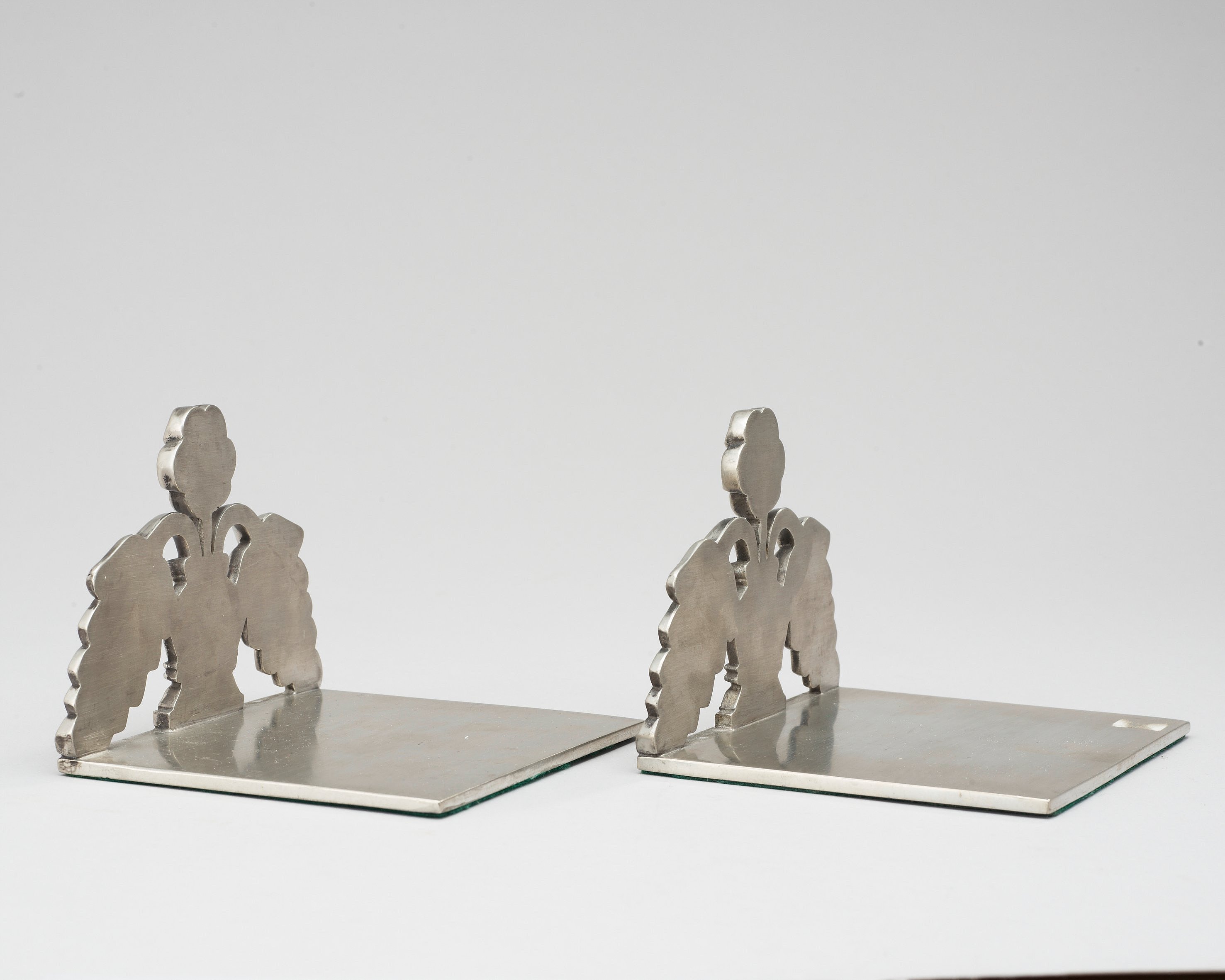 A pair of Svenskt Tenn pewter bookends, possibly by Estrid Ericson ...